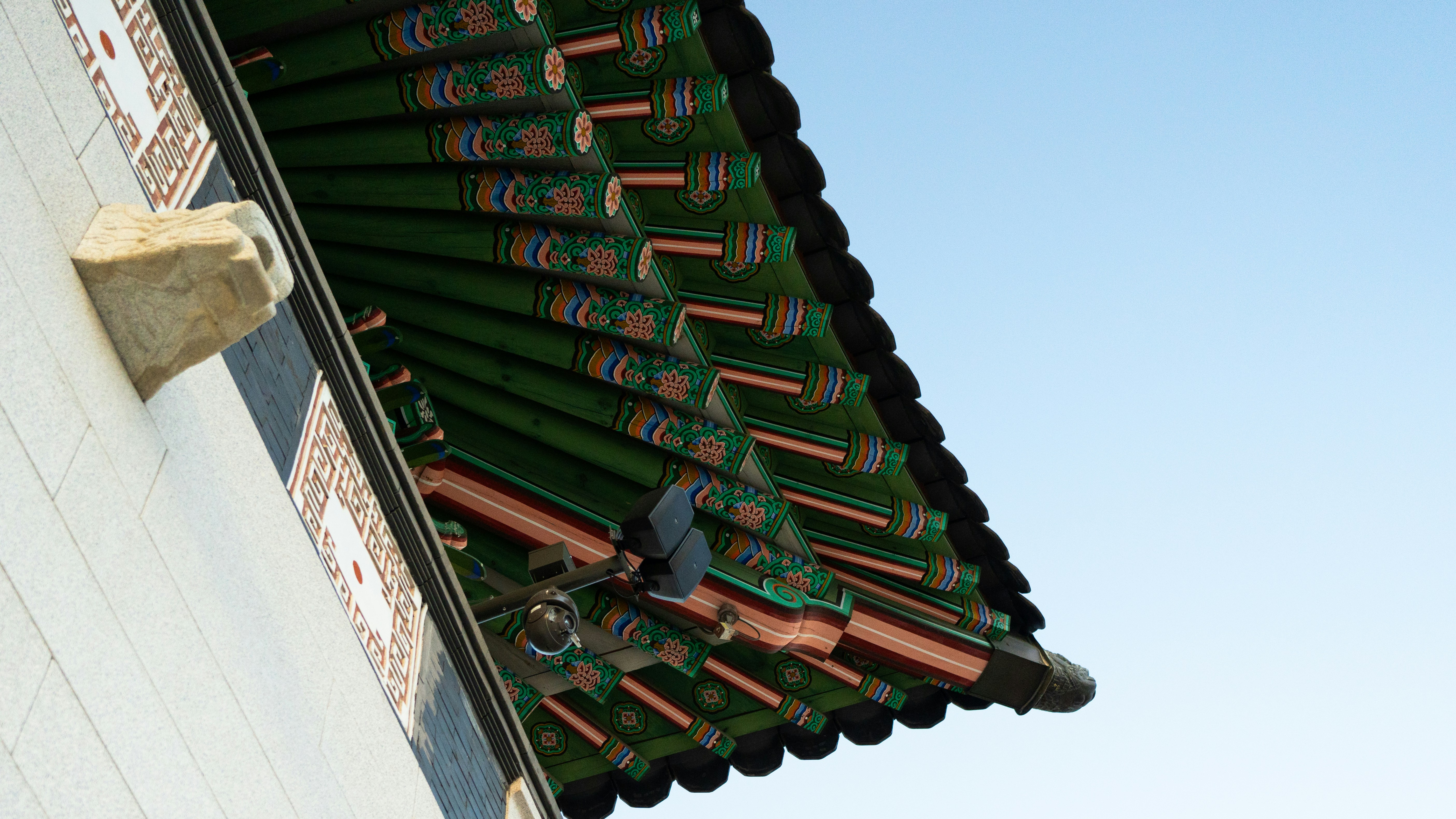 A close up of a roof with a sky in the background photo – Free Roof ...
