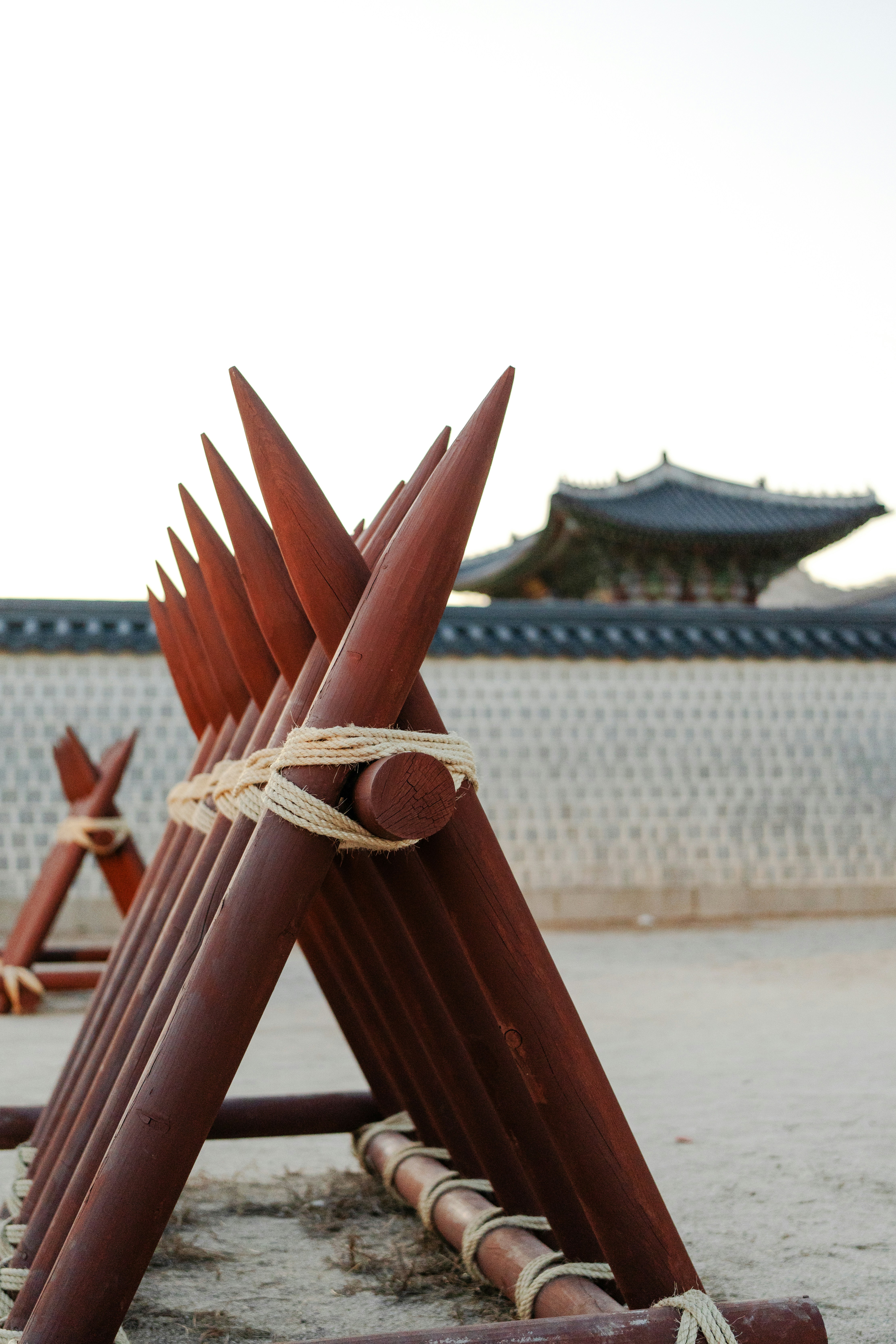 Crimson Spires Framing a Quiet East Asian Courtyard