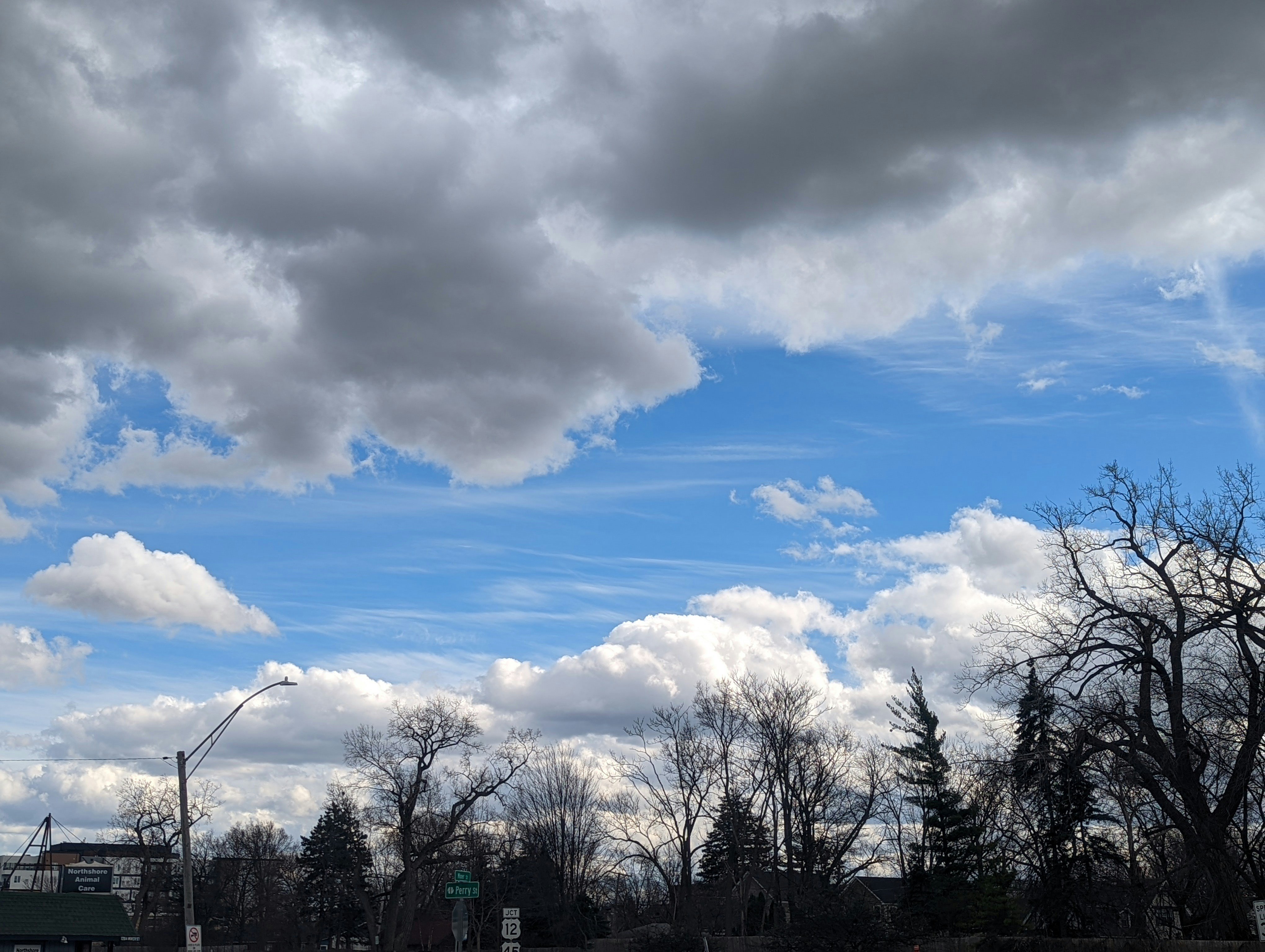 Cloudscape Over a Quiet Suburban Horizon
