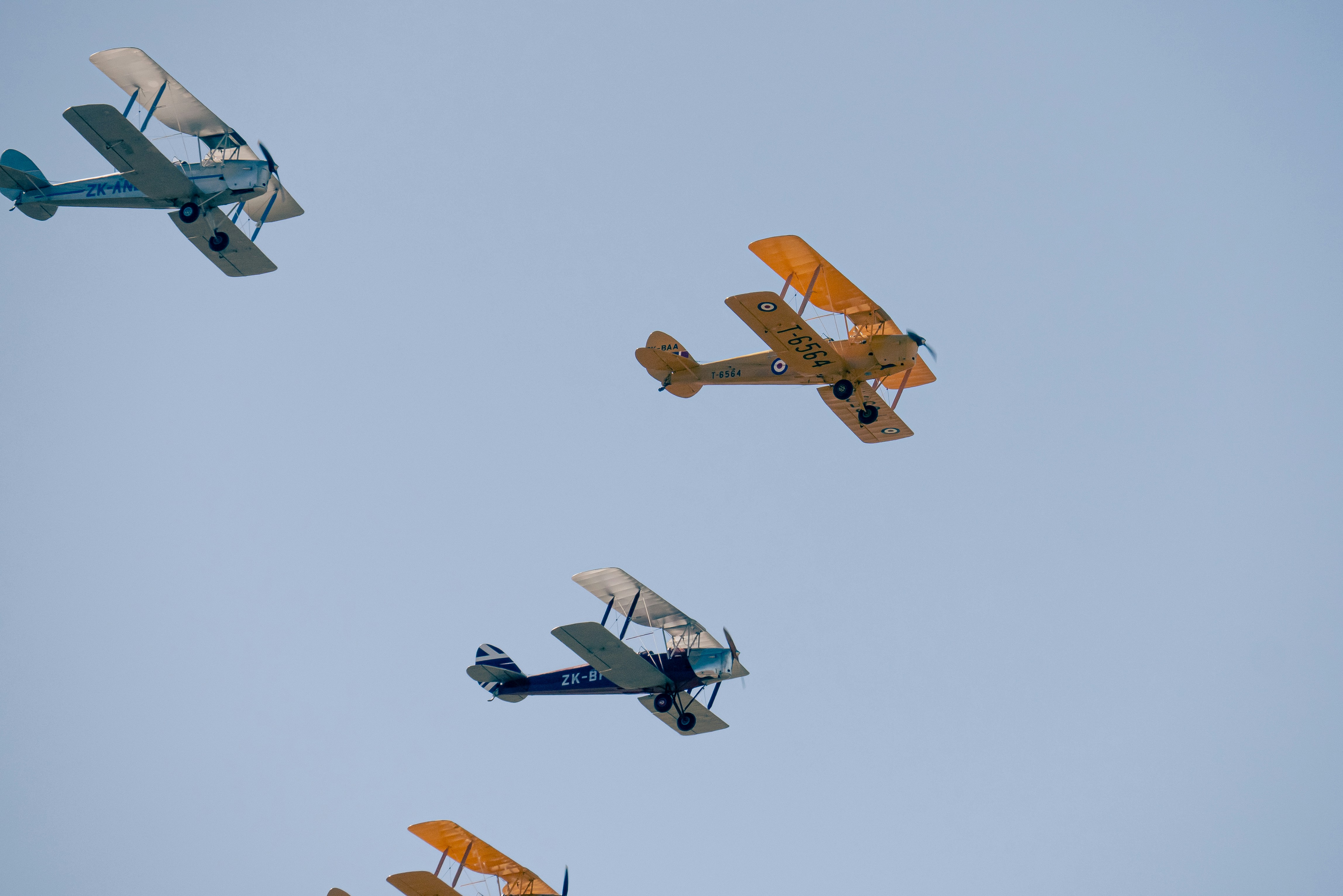Three small airplanes flying in the sky together photo – Free New ...
