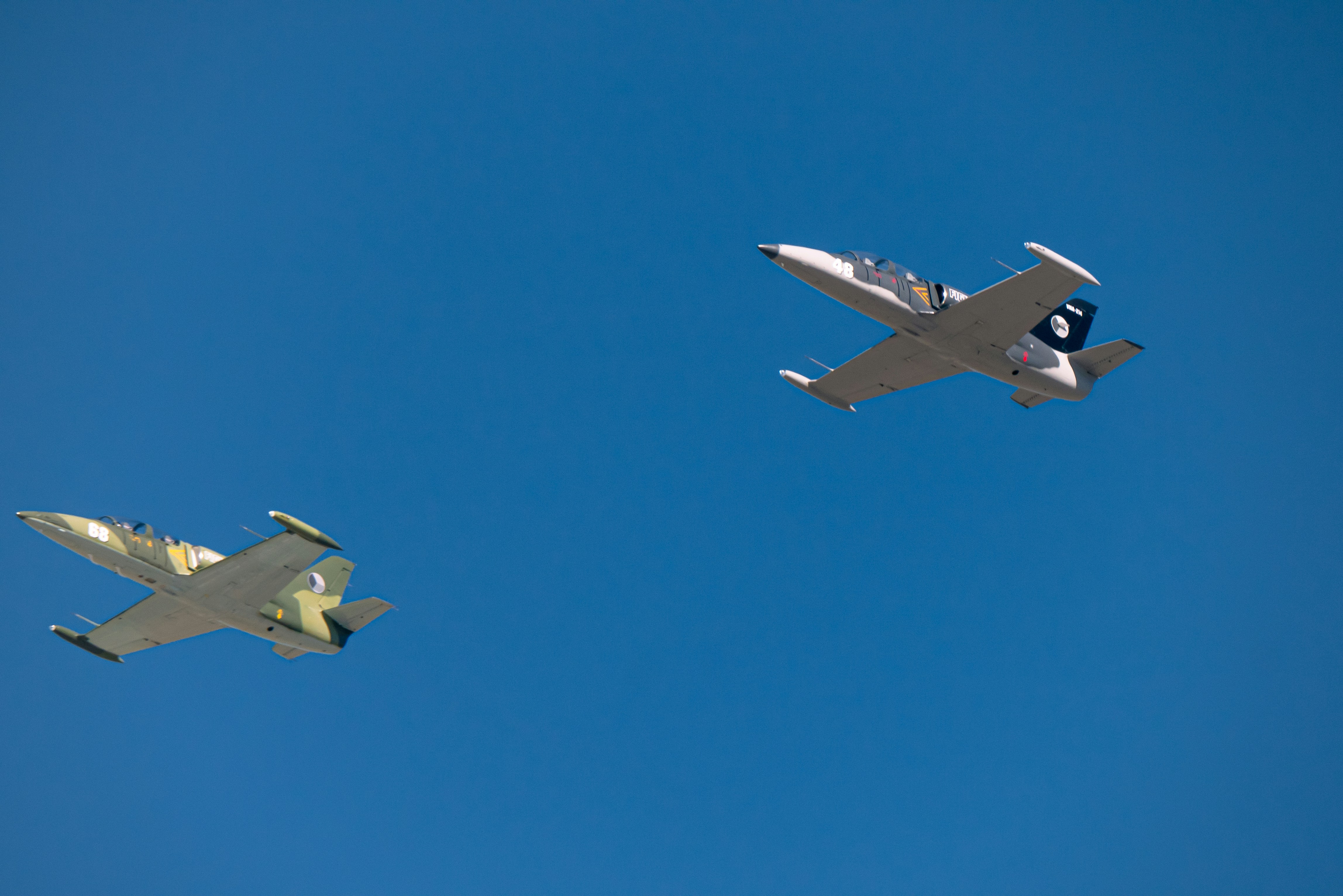 Two planes flying side by side in the sky photo – Free Warbirds over ...