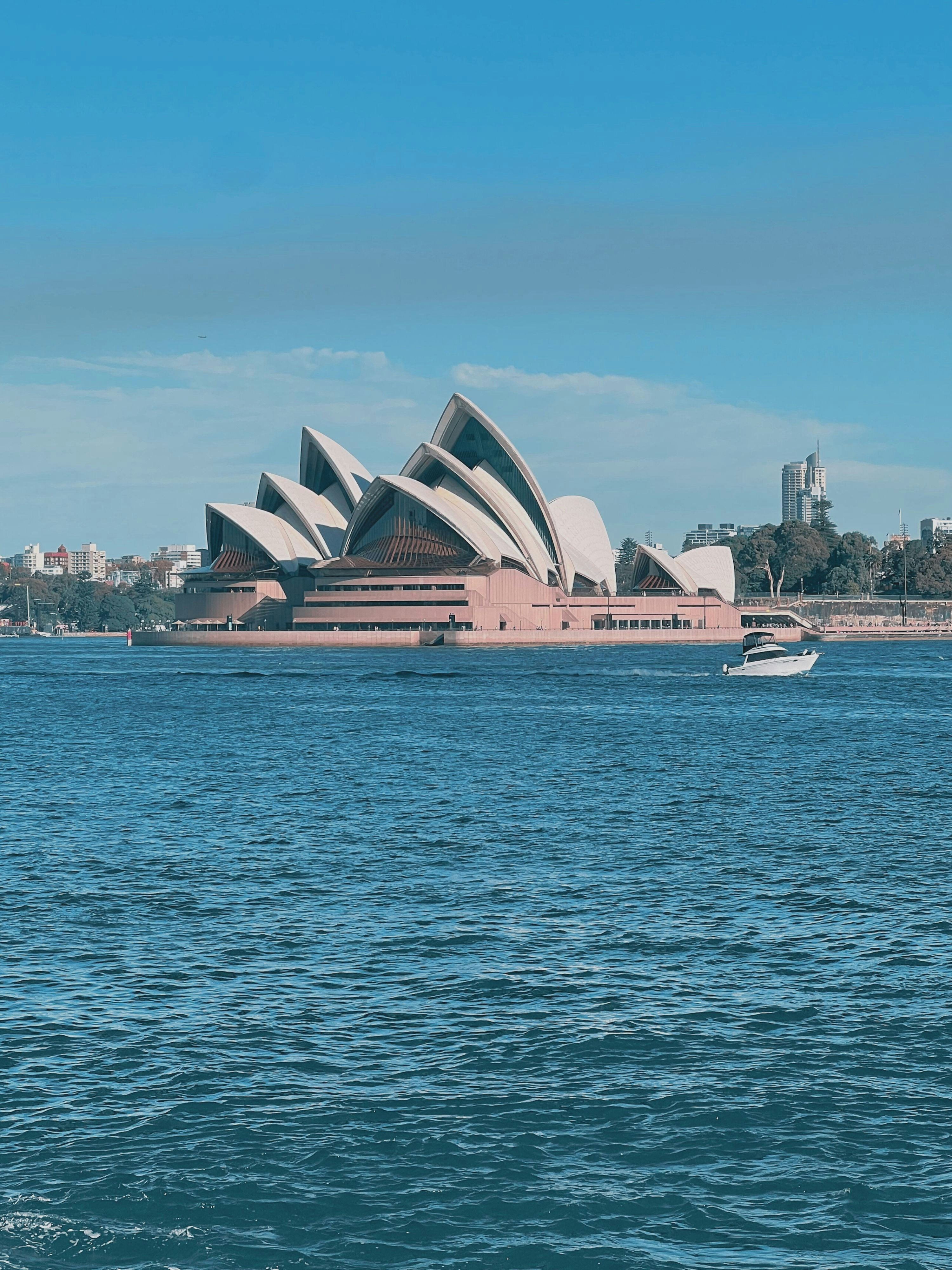 A view of the sydney opera house from across the water photo – Free ...