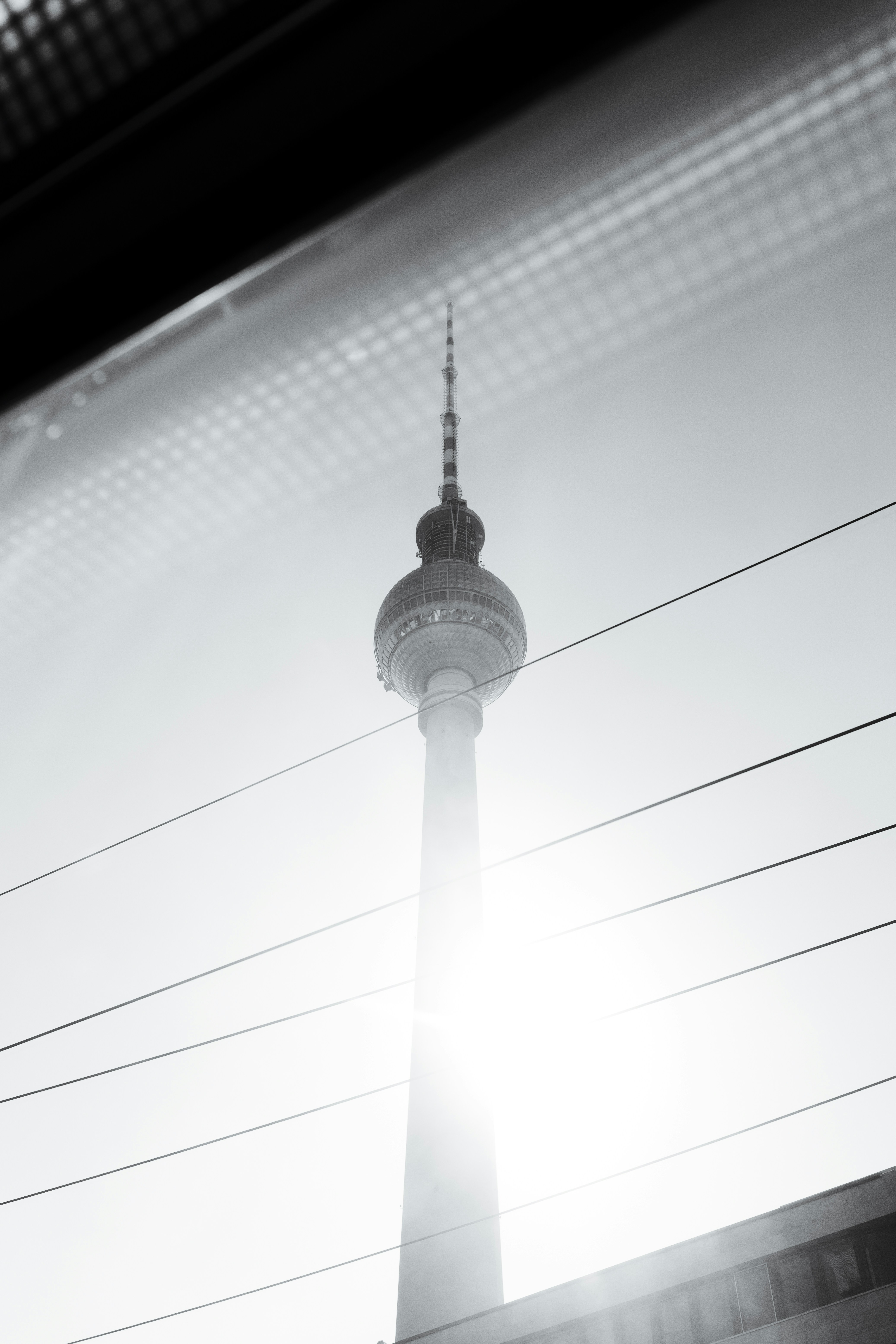 Sunburst on a Tower Cut by Parallel Wires