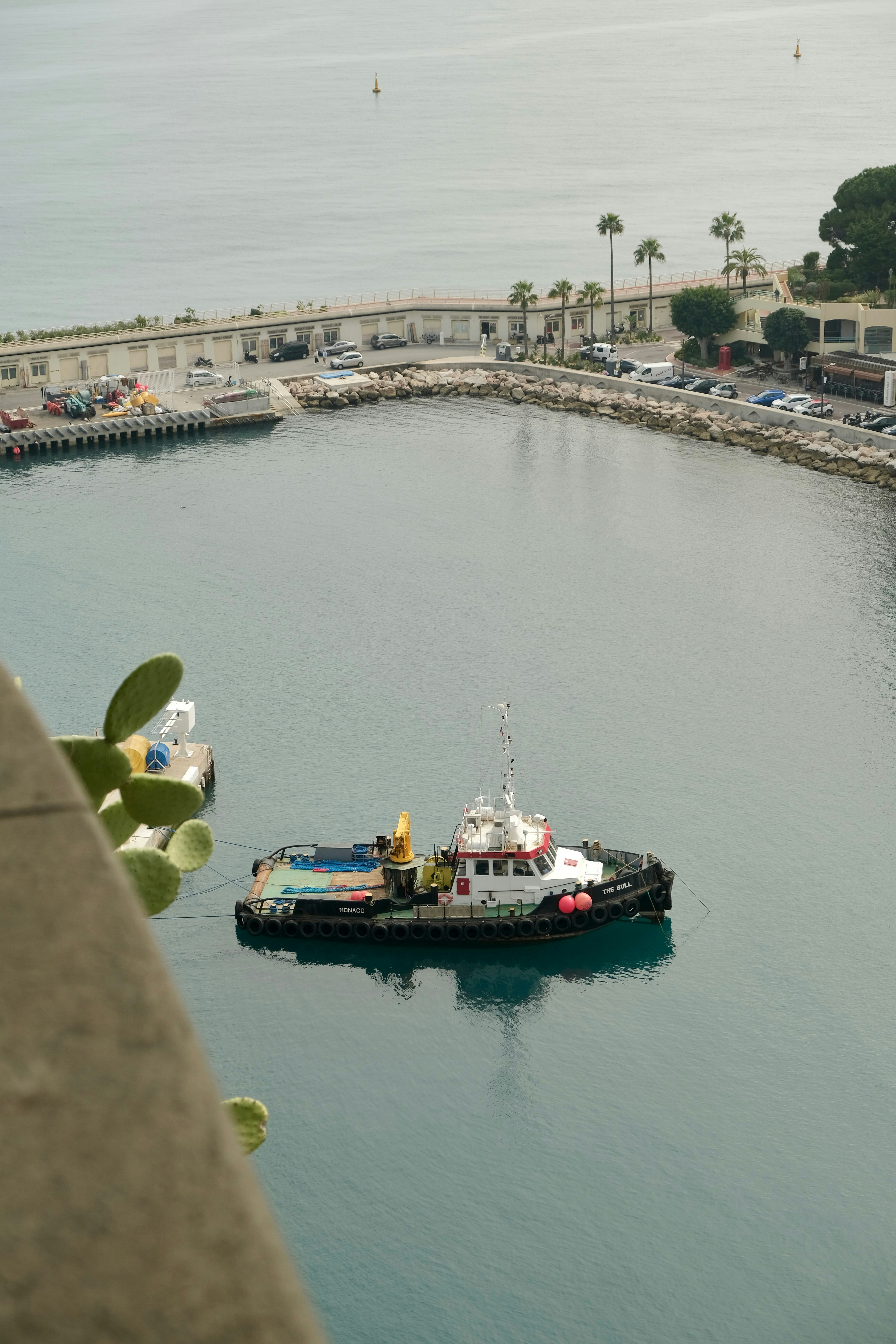 Harbor Tug bobbing in calm turquoise waters