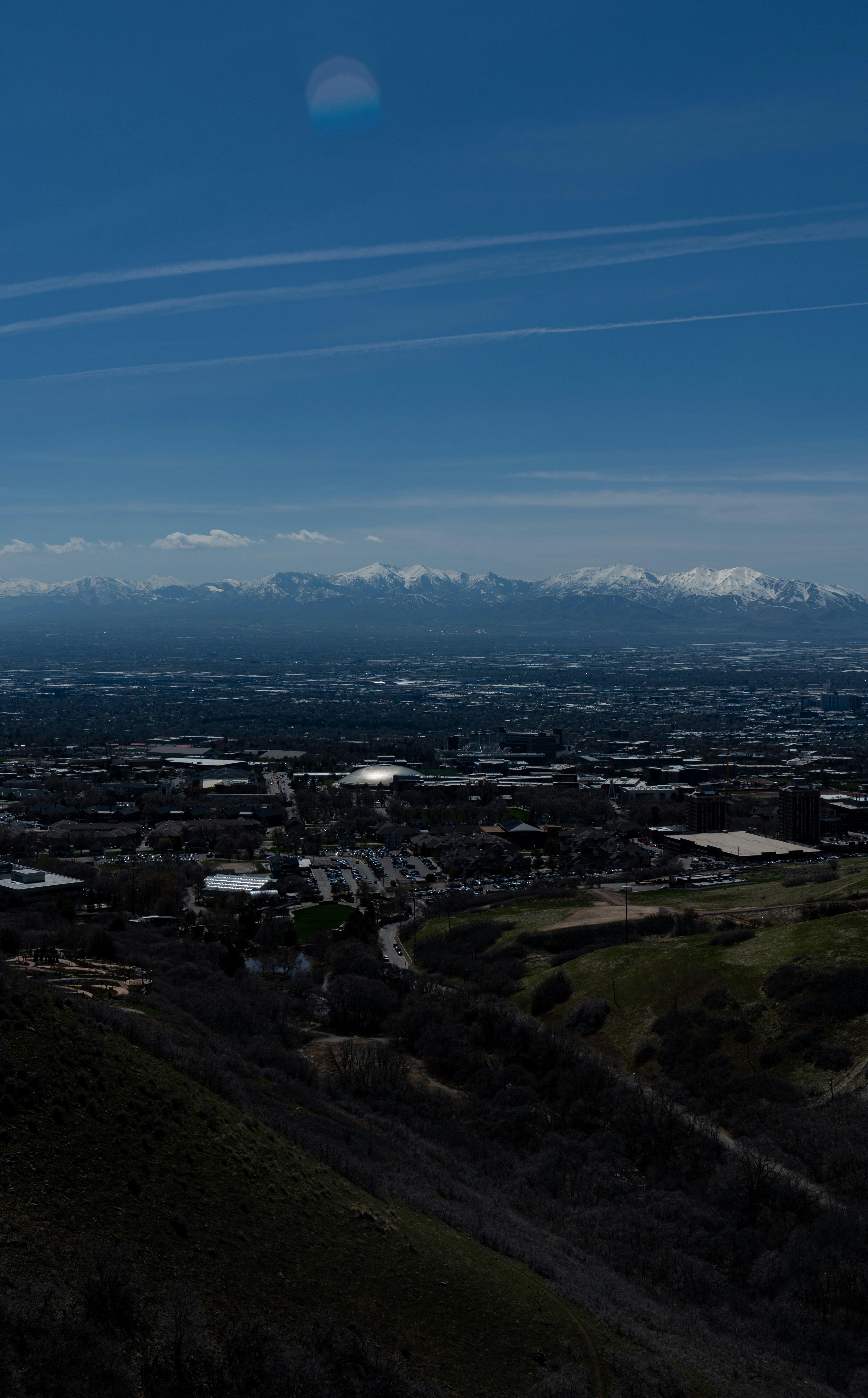 Urban Oasis Beneath Majestic Peaks