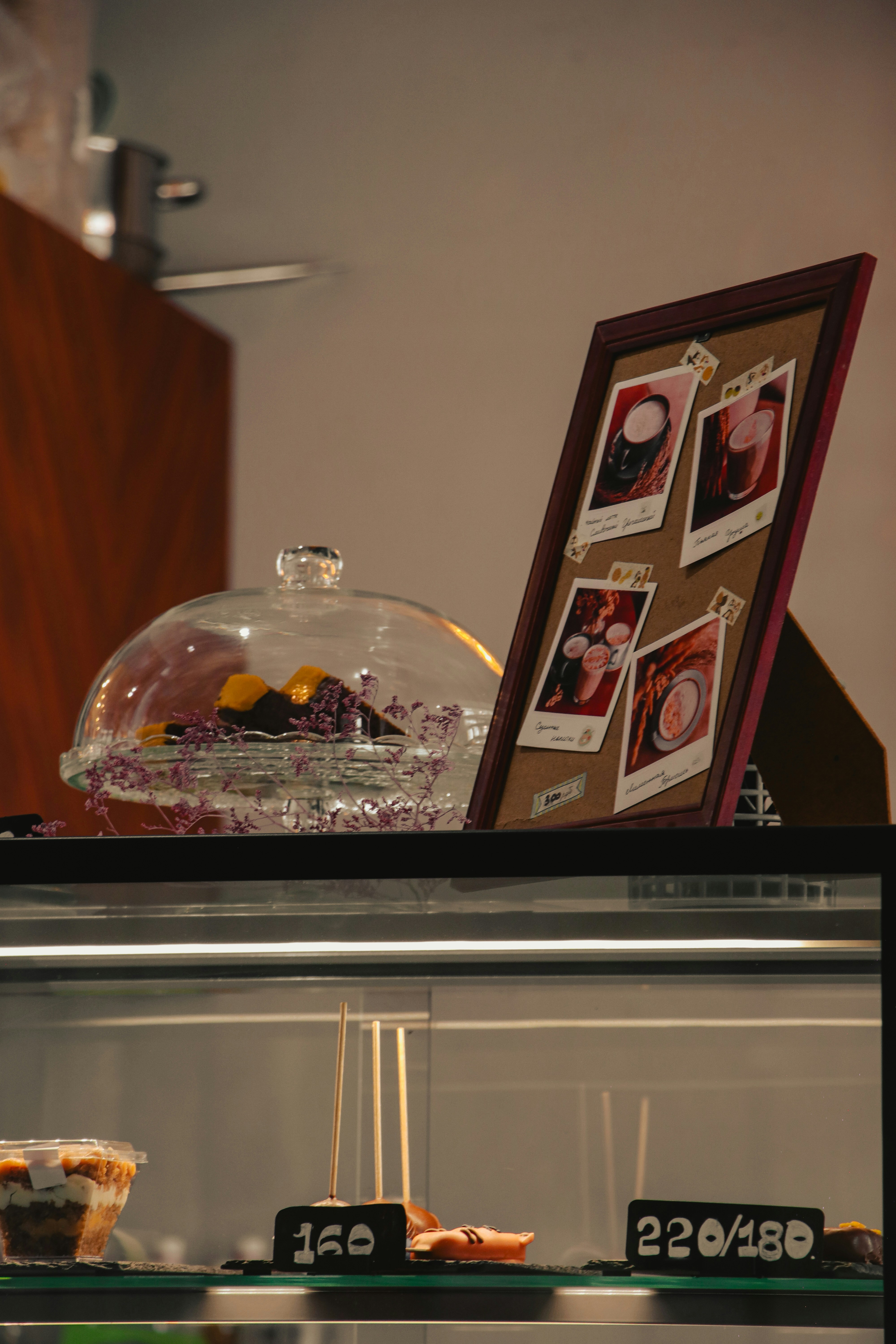 Display Case Duet: Cakes, Frames, and a Glass Dome