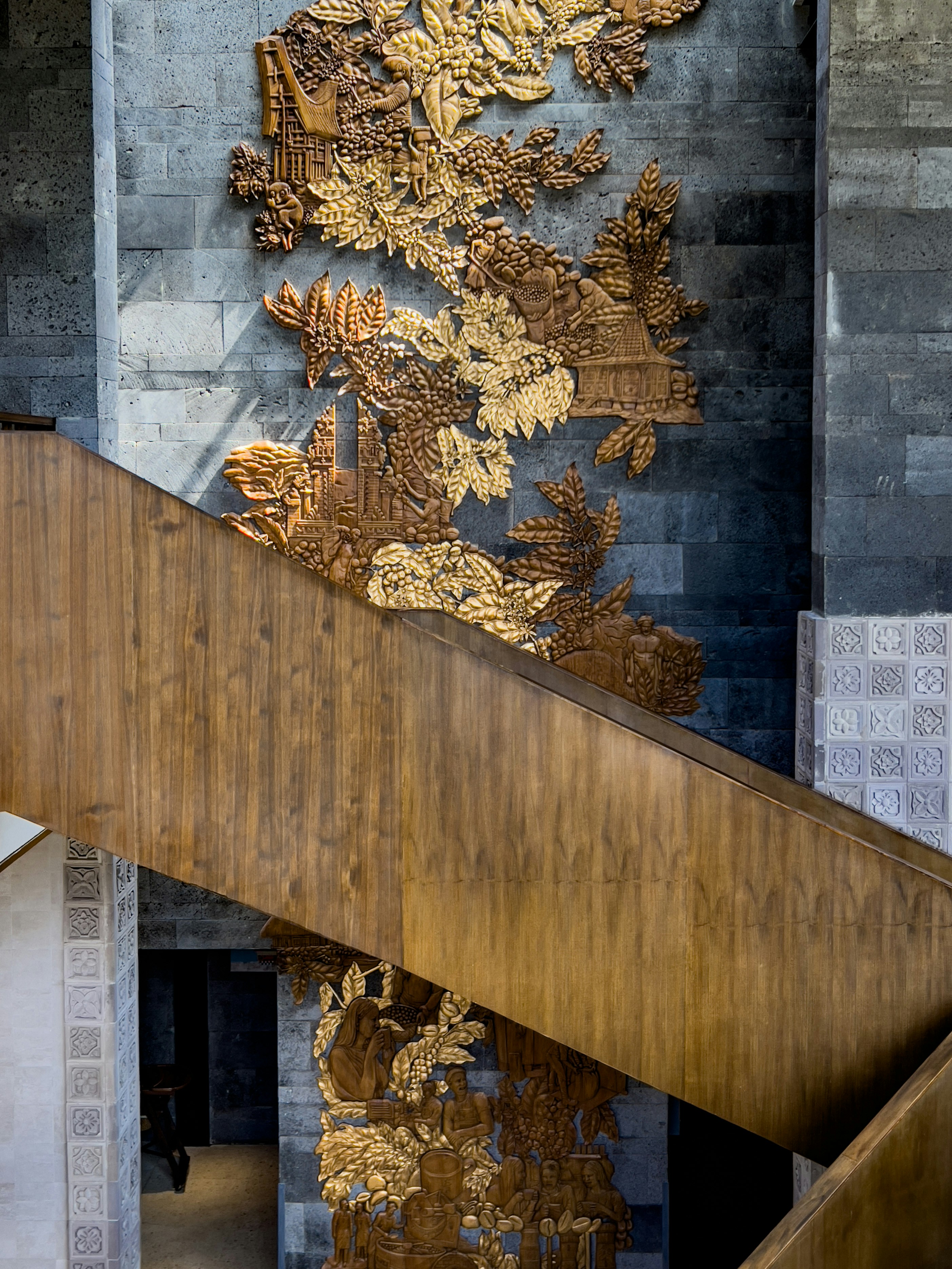 Gilded Laurel Cascade Climbing a Concrete Staircase