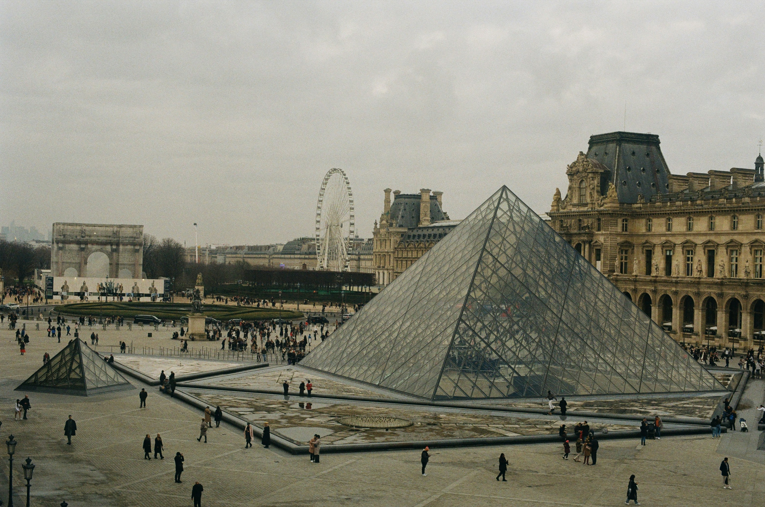 A large pyramid in the middle of a courtyard photo – Free Building ...
