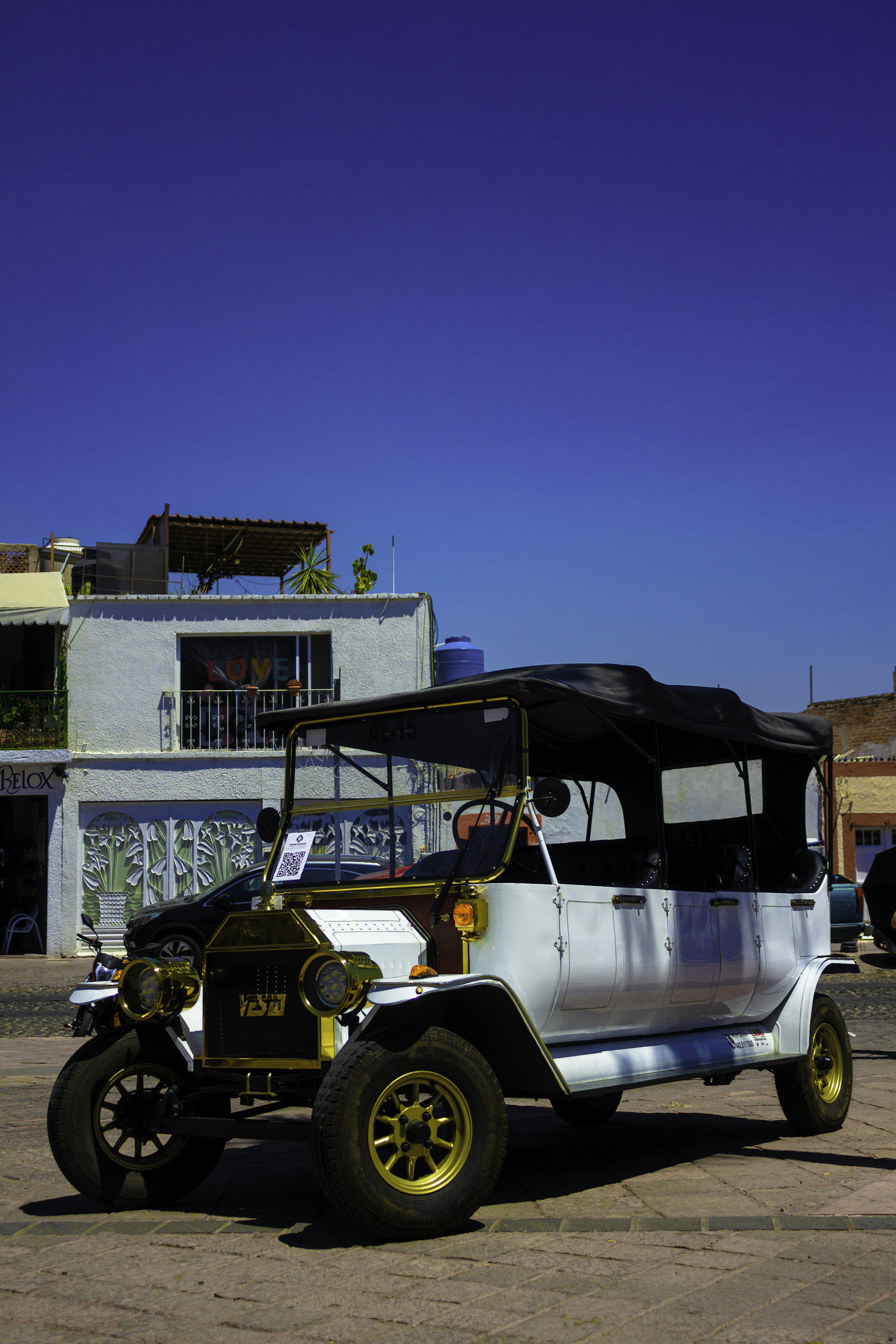Vintage Ride in a Sunlit Plaza