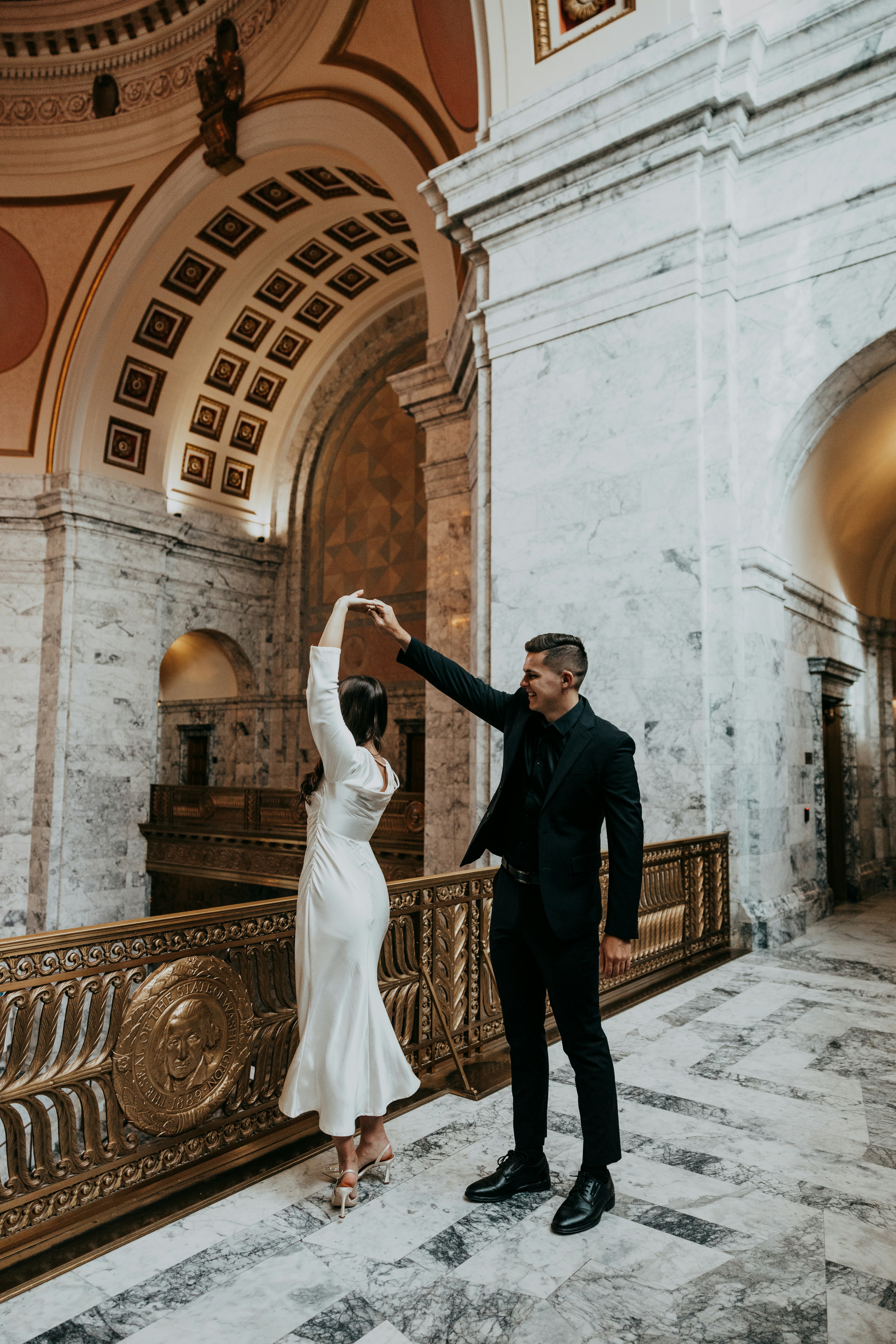 A man and a woman dancing in a building photo – Free Person Image on ...
