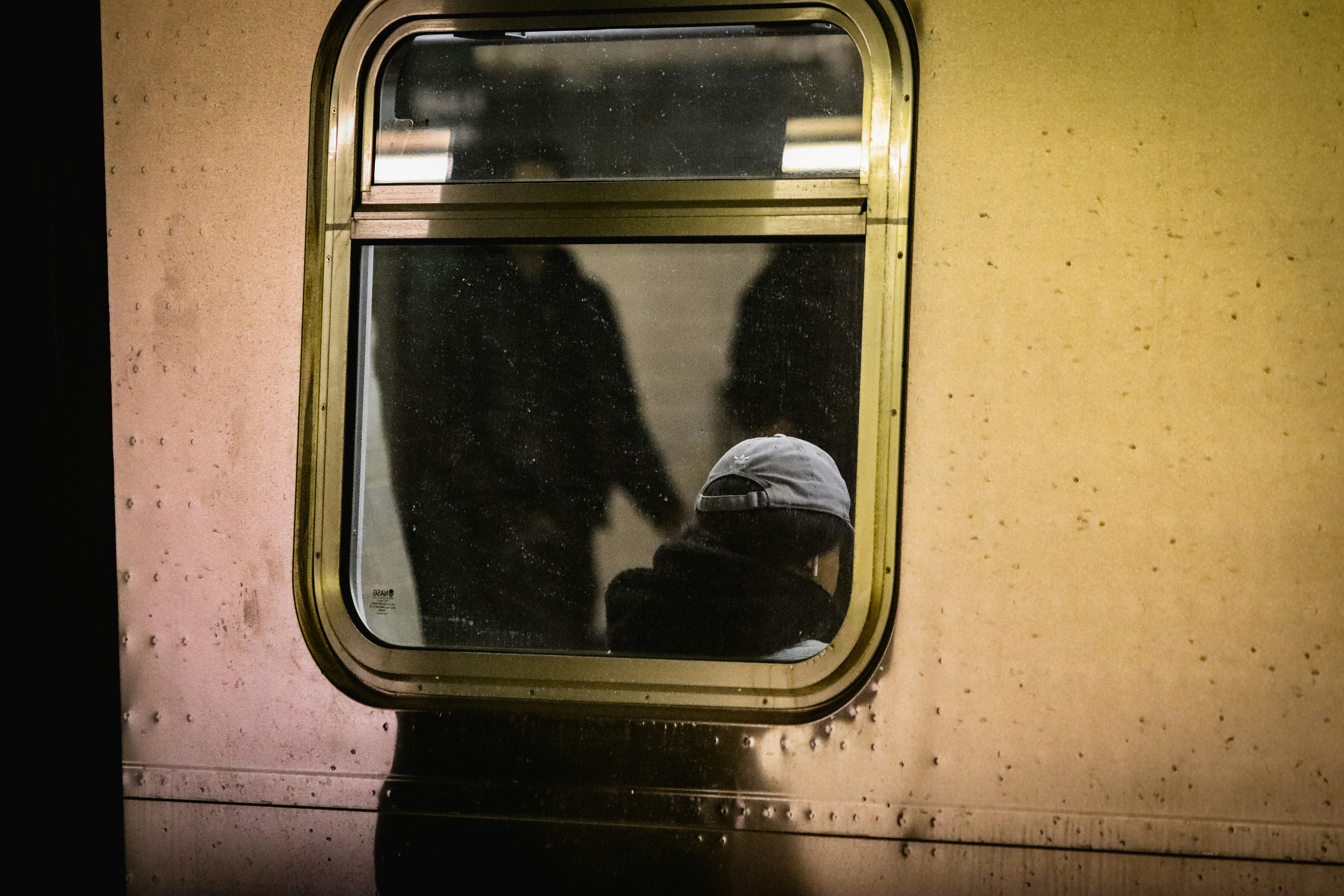 A person looking out of a train window photo – Free Lonliness Image on ...