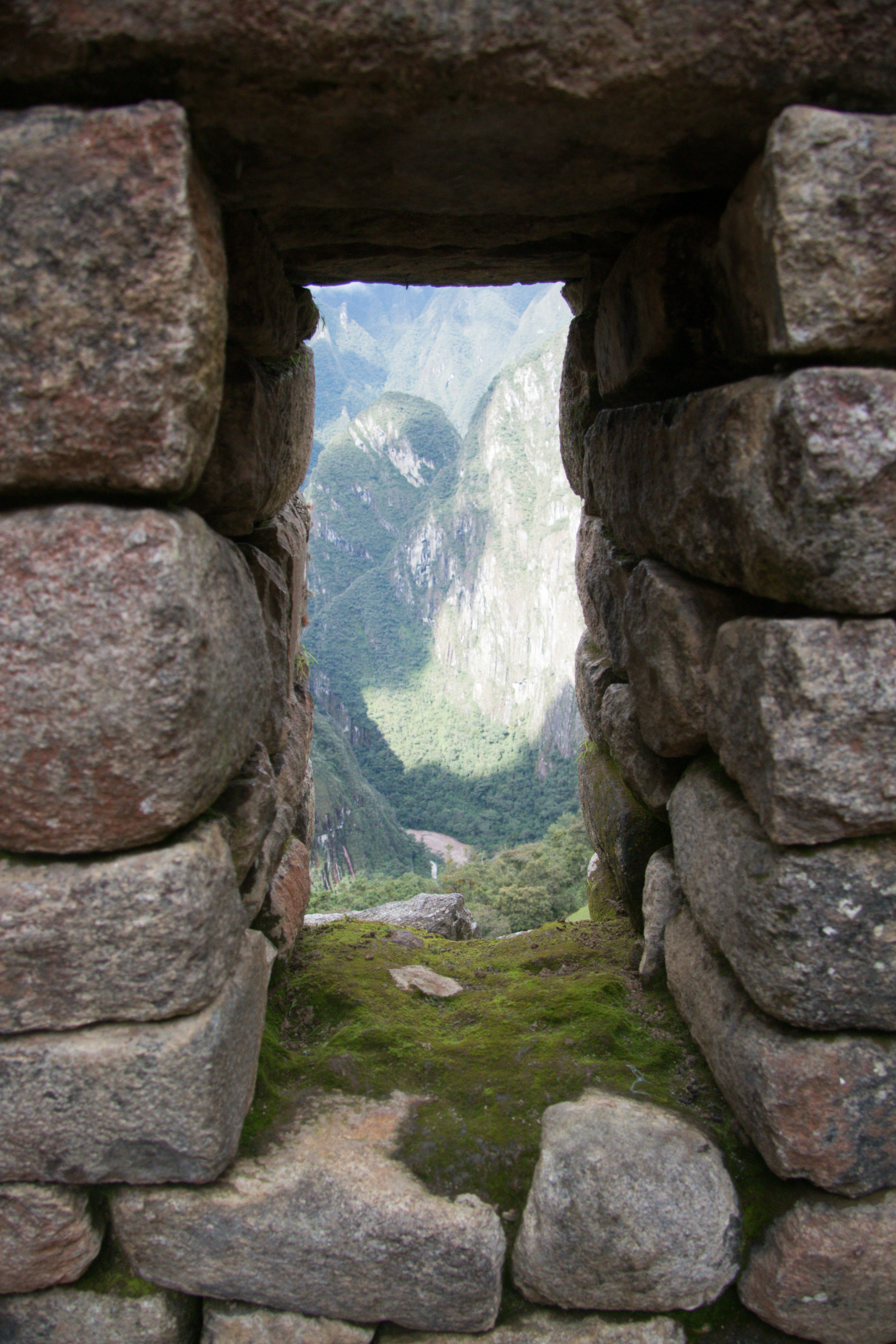 Stone Gate Framing a Mountain Valley
