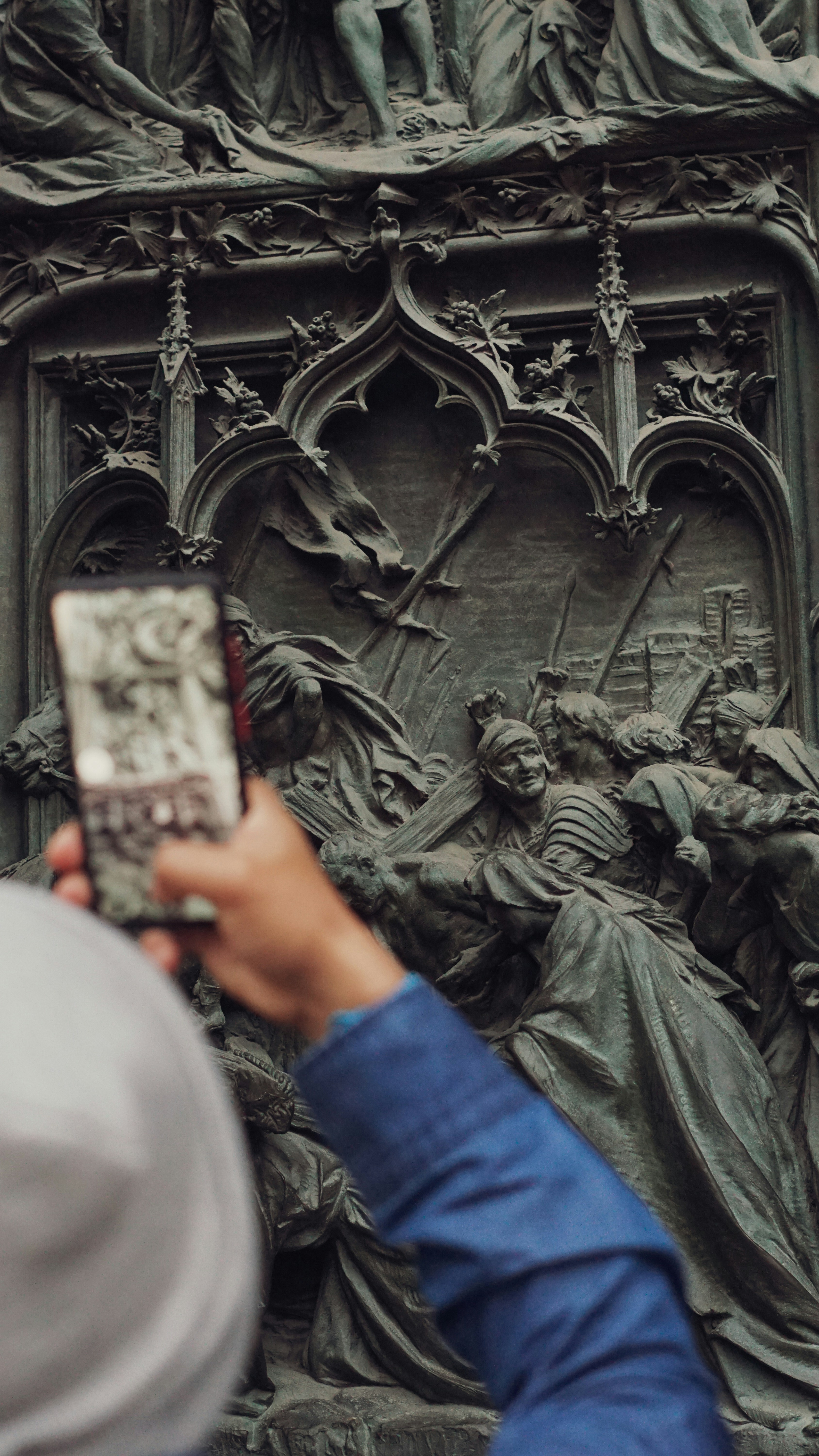 Blue Sleeve, Bronze Stories: Capturing a Monument’s Carved Moment
