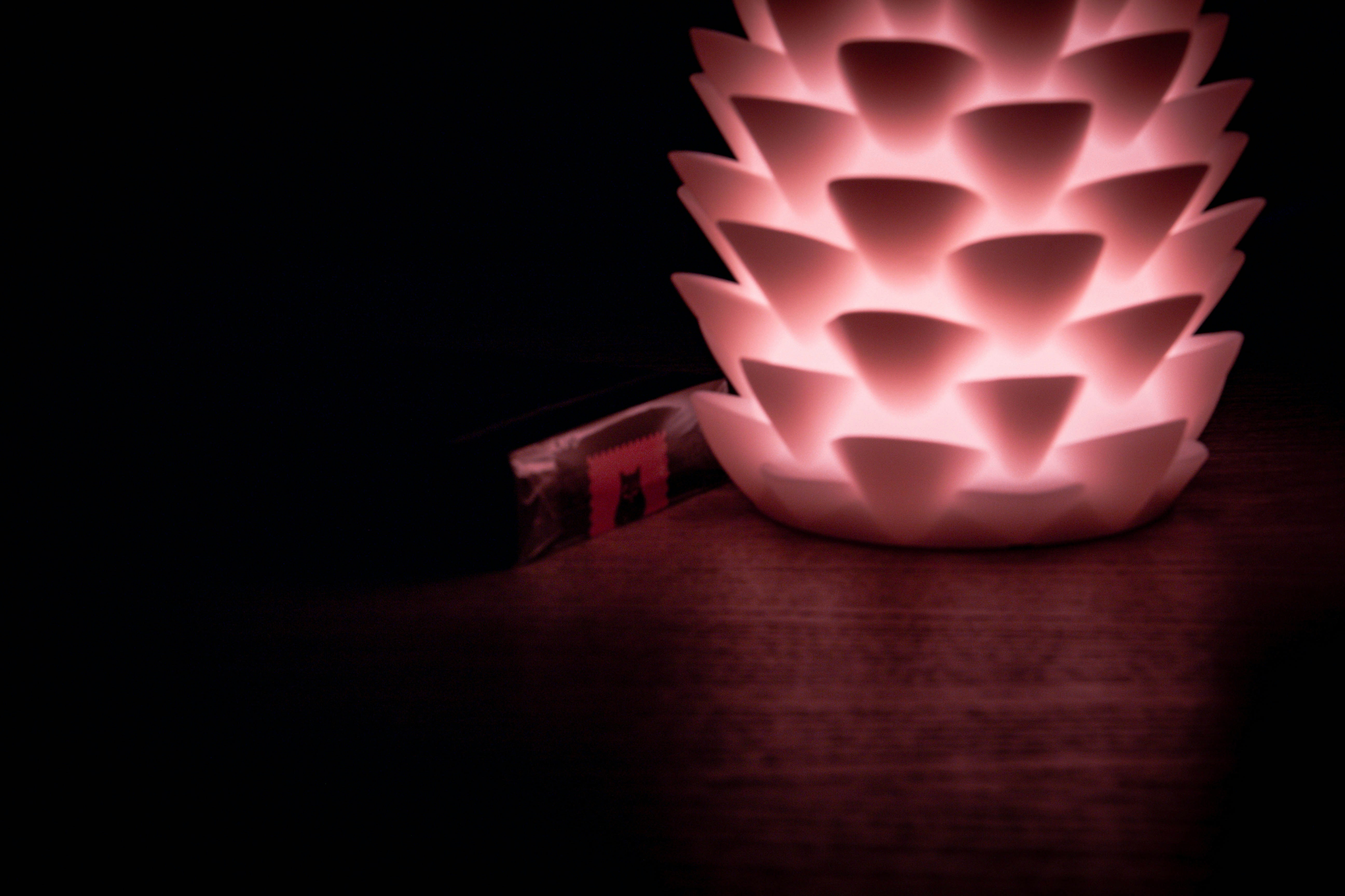 Stacked Pink Geometry: Quiet Warmth on a Dark Table