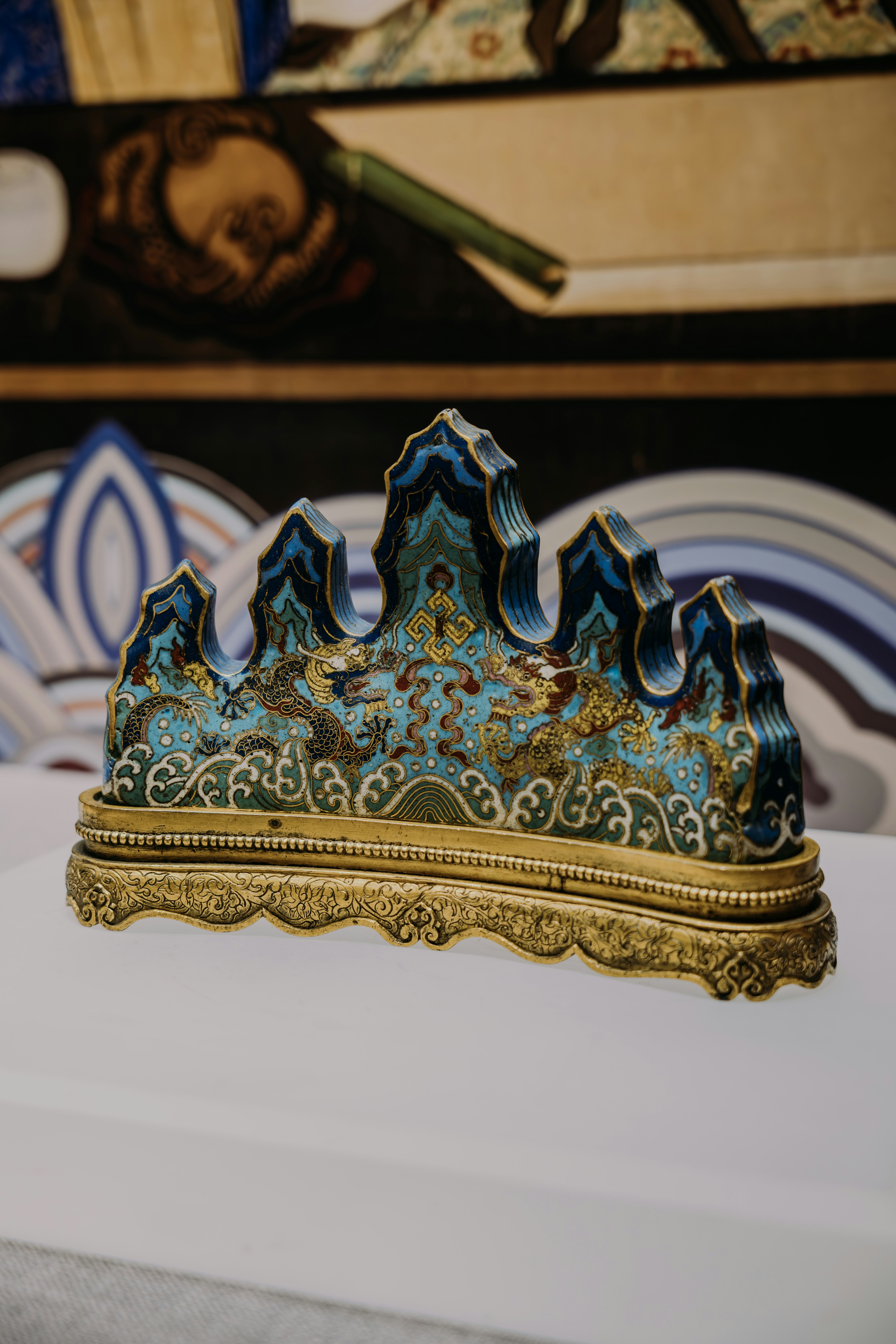 Turquoise-Embellished Crown of Waves on a Golden Pedestal