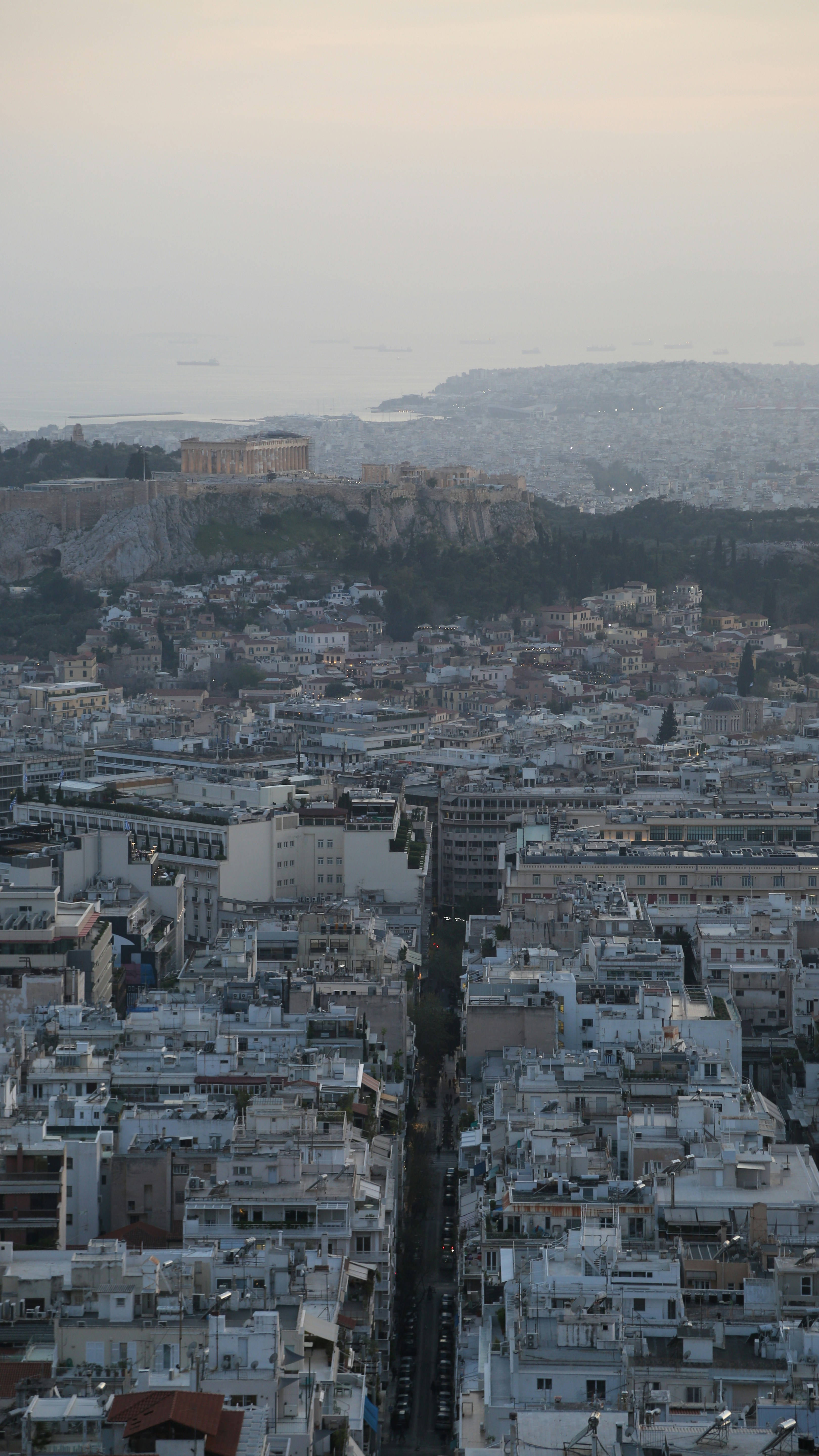 A view of a city with lots of tall buildings photo – Free Athens Image ...