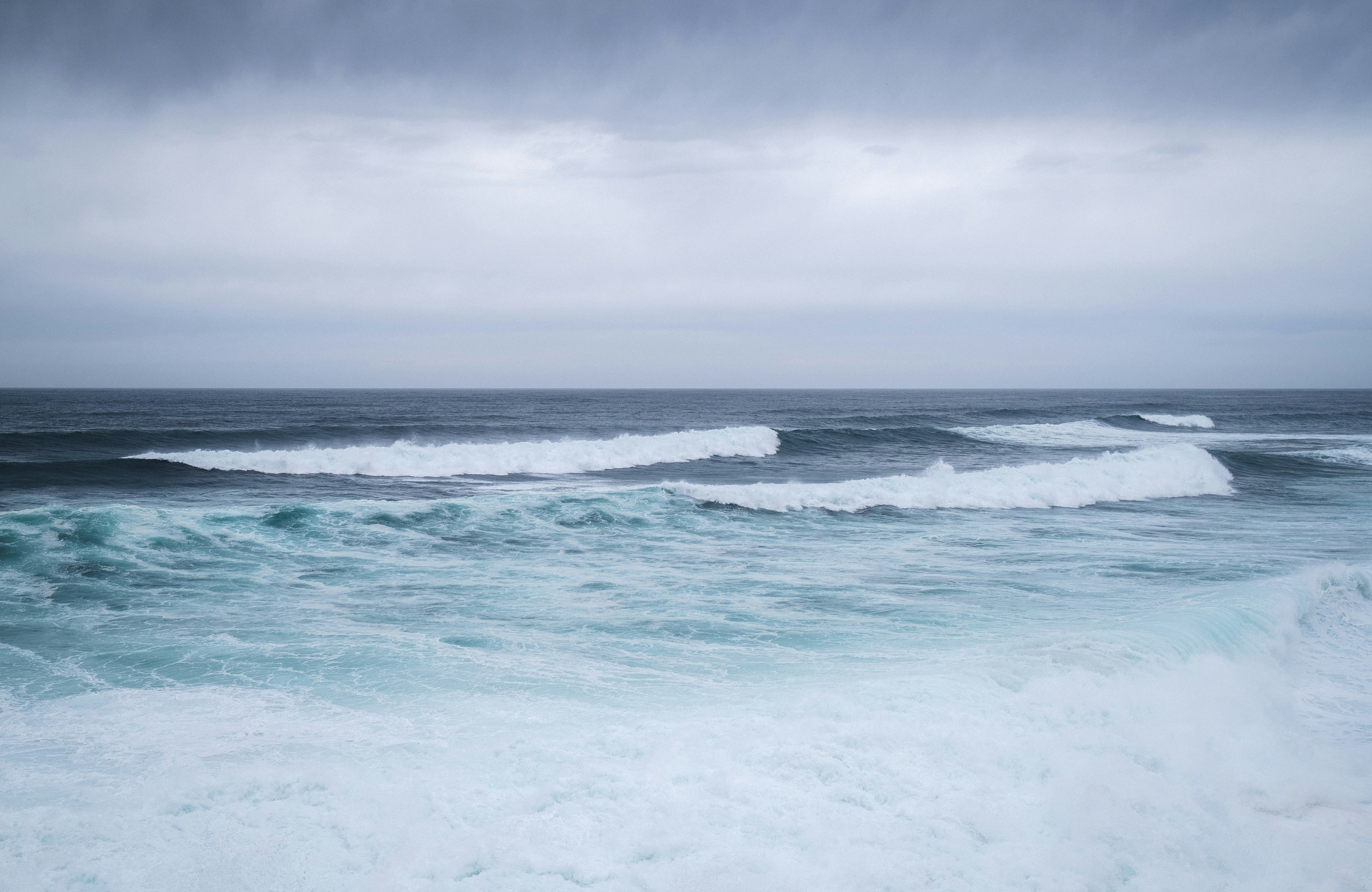 A body of water that has some waves in it photo – Free Waves Image on ...