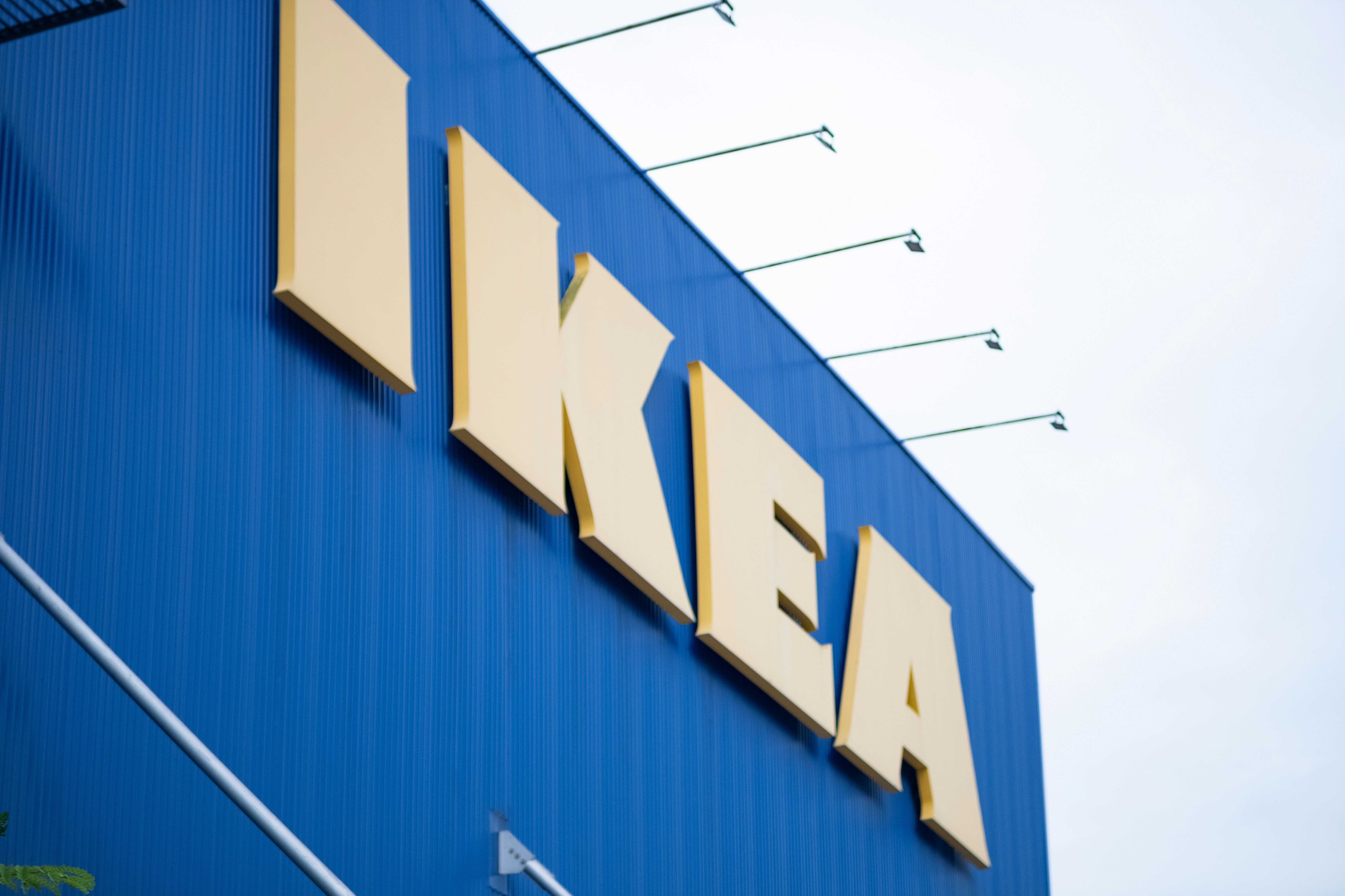 A large ikea sign on the side of a building photo – Free Ikea kota baru ...