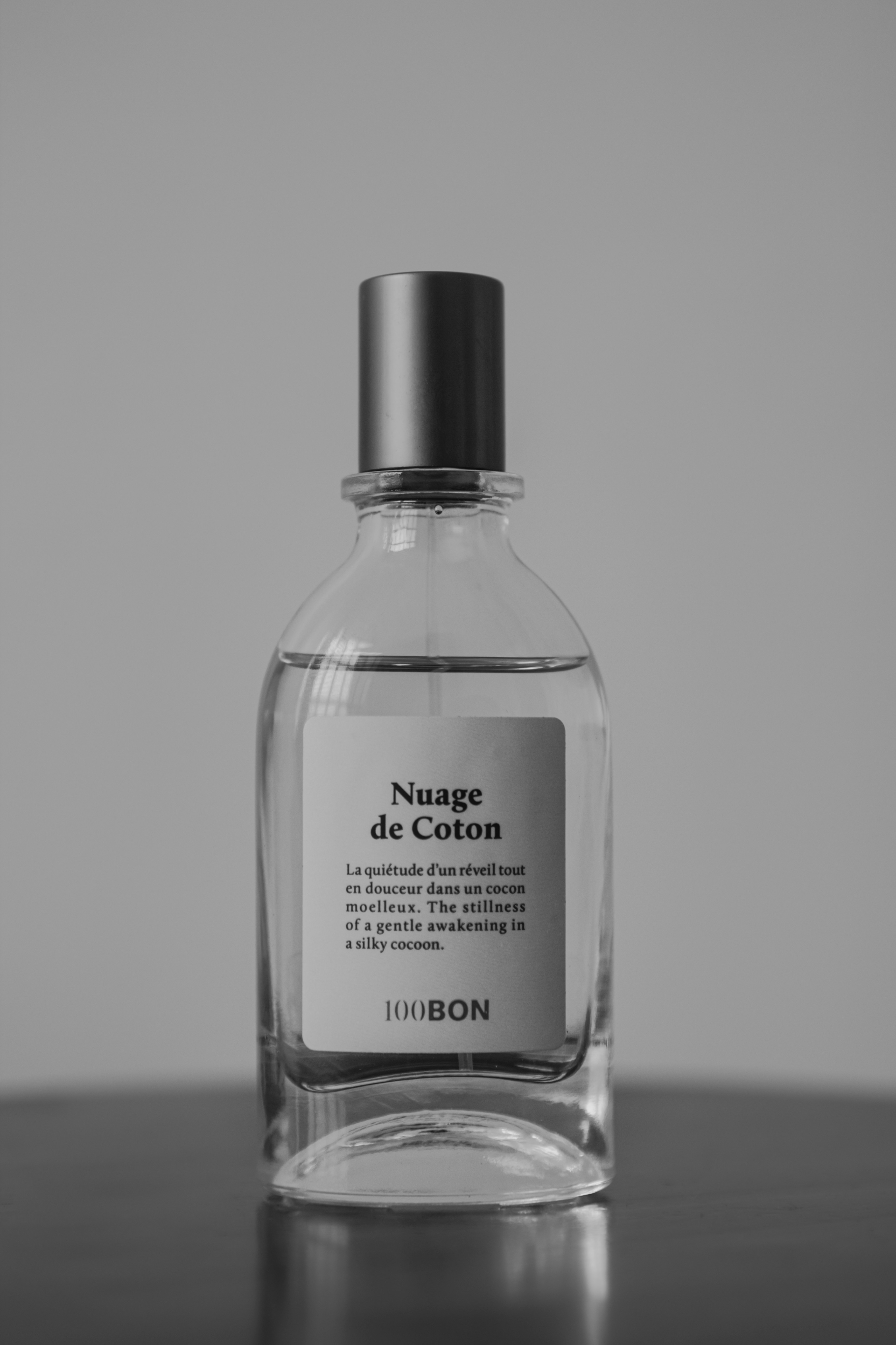 Nuage de Coton: A Minimalist Monochrome Perfume Bottle