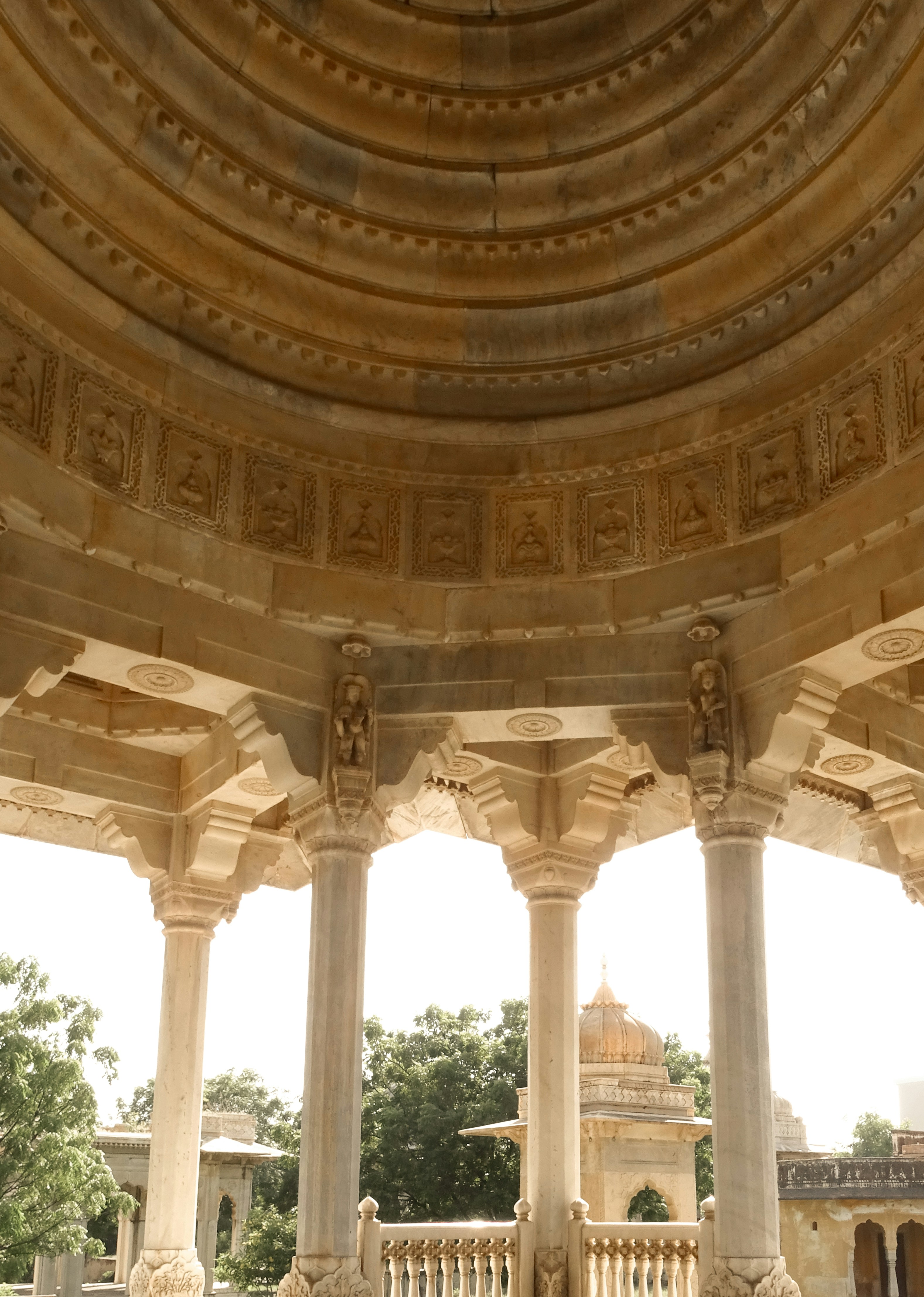 A group of pillars with a clock on top of it photo – Free Jaipur Image ...