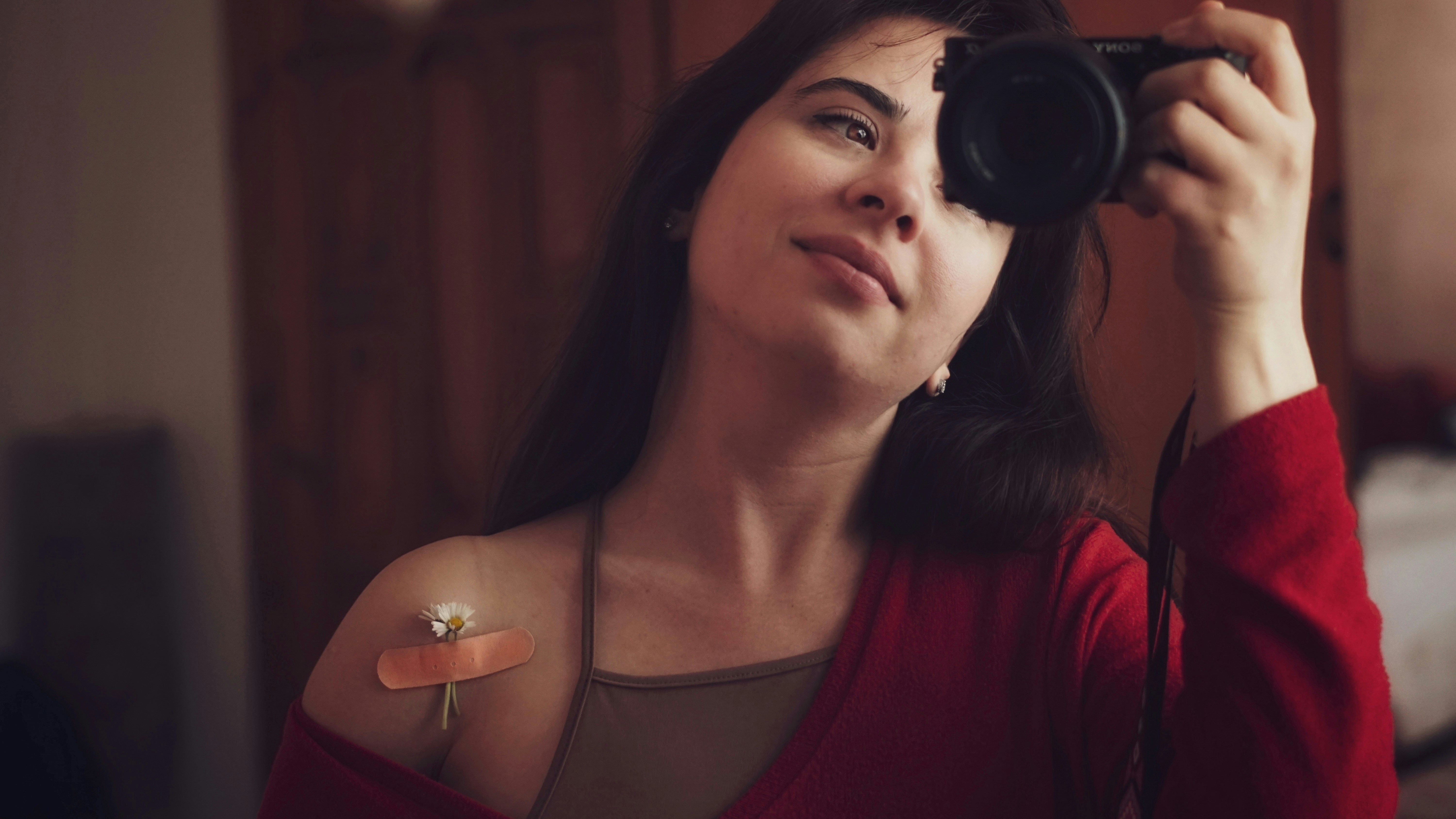 Amber Quiet: A Self-Portrait Framed by Warm Indoor Light