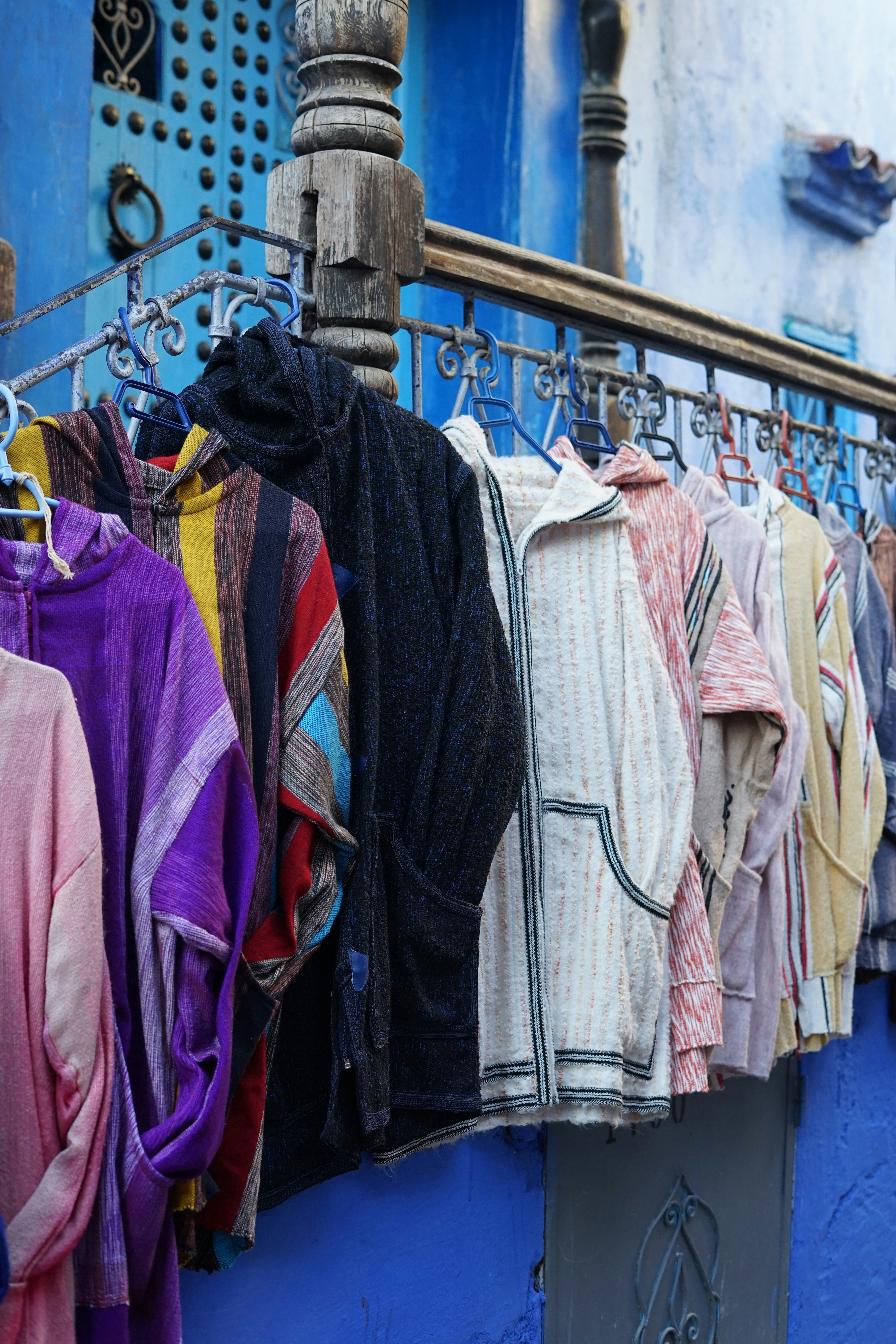 A bunch of clothes hanging on a clothes line photo – Free Blue ...