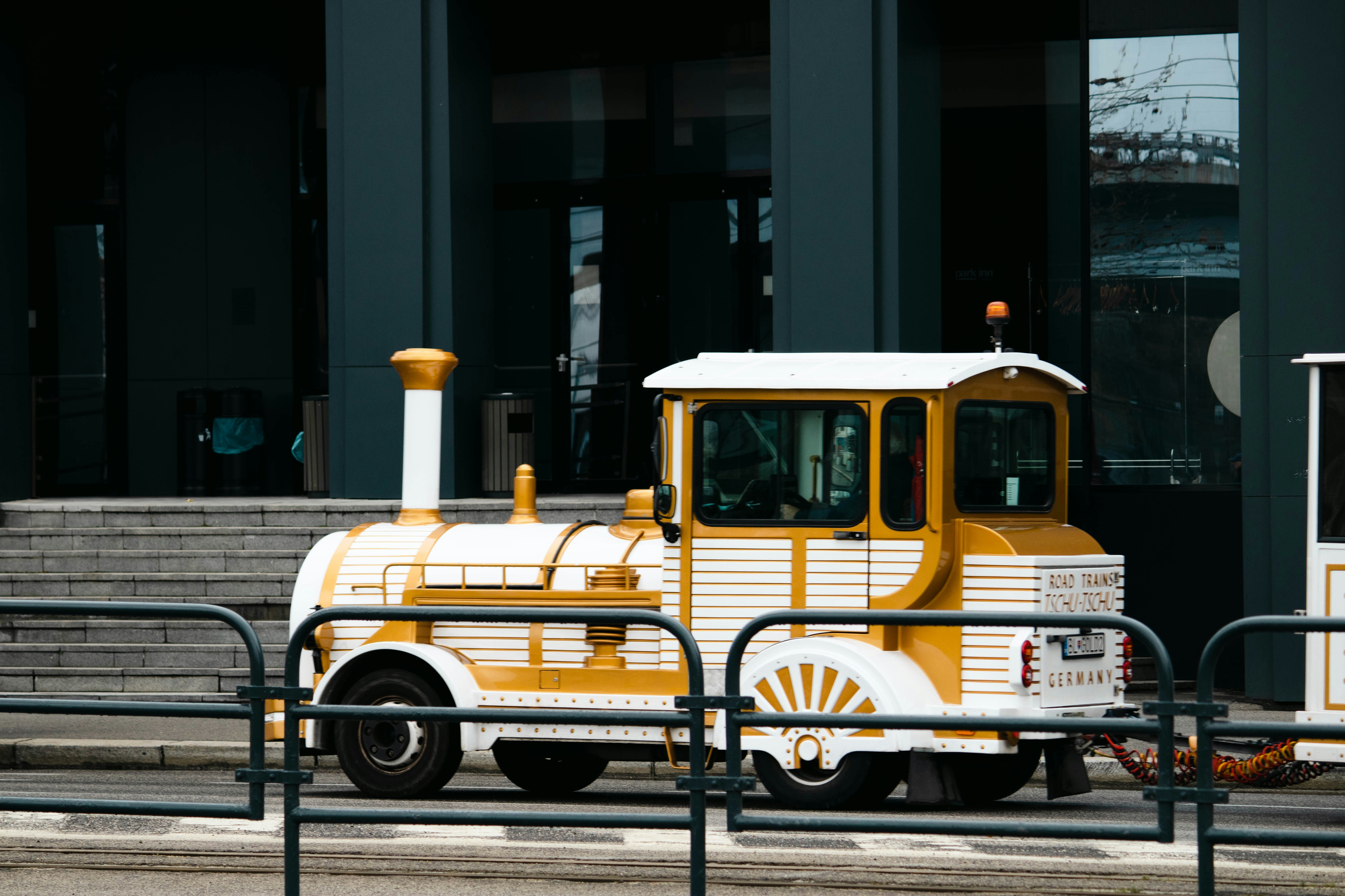 Miniature Steam Loco Anchored in an Urban Glass Frame
