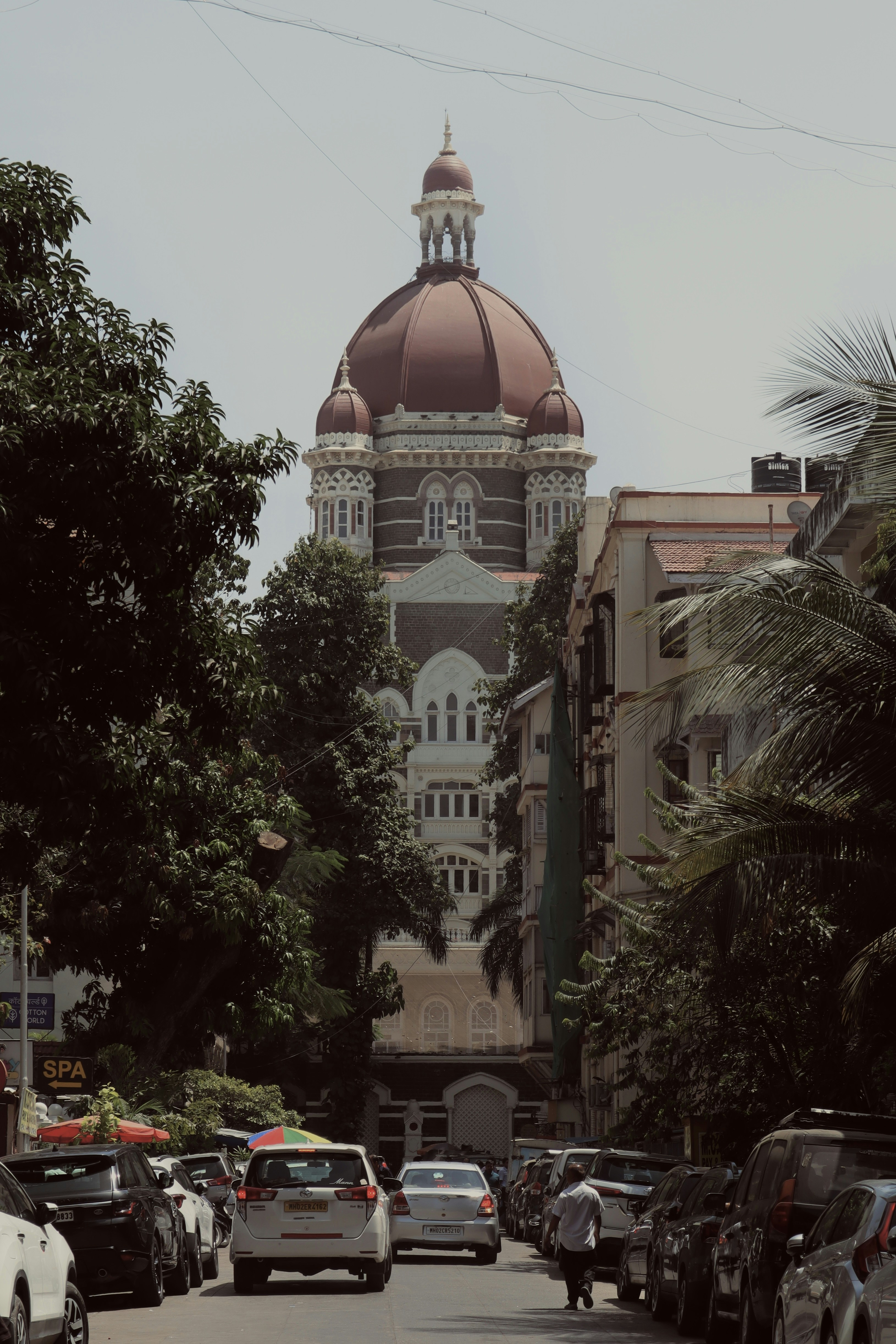 Taj hotel in Mumbai city | a large building with a dome on top of it