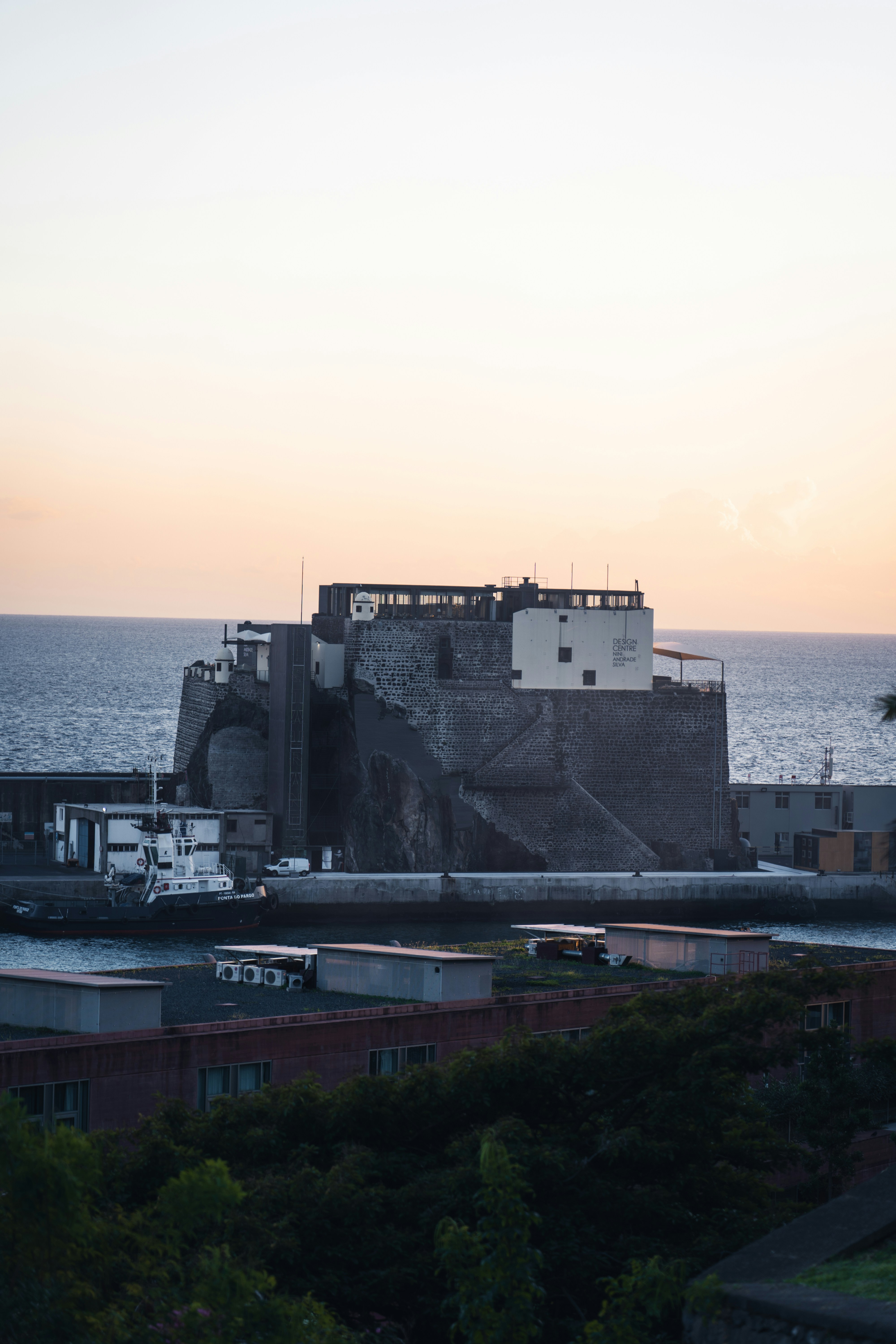 Dusk at the Cliff Fortress Overlooking a Quiet Harbor