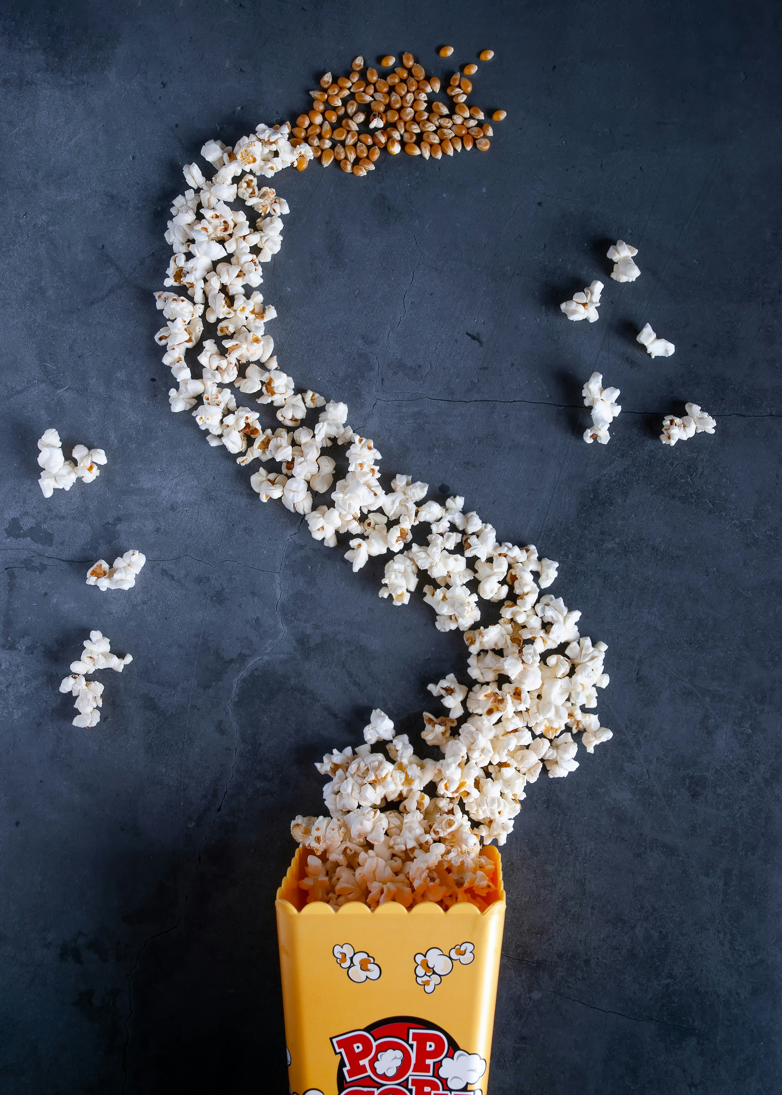 A popcorn box filled with lots of popcorn photo – Free Food and drink ...