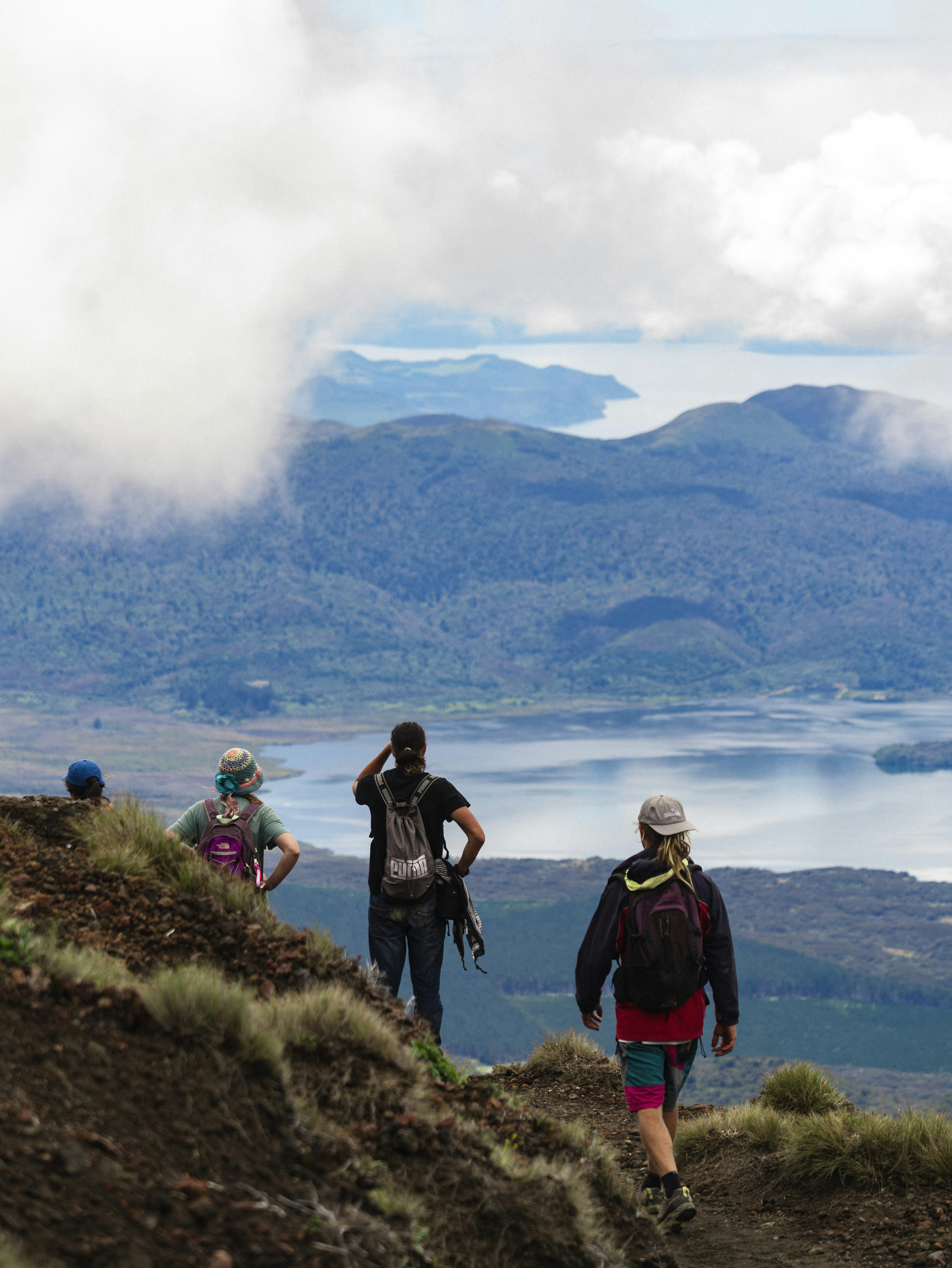 A group of people hiking up a hill photo – Free Hiking Image on Unsplash