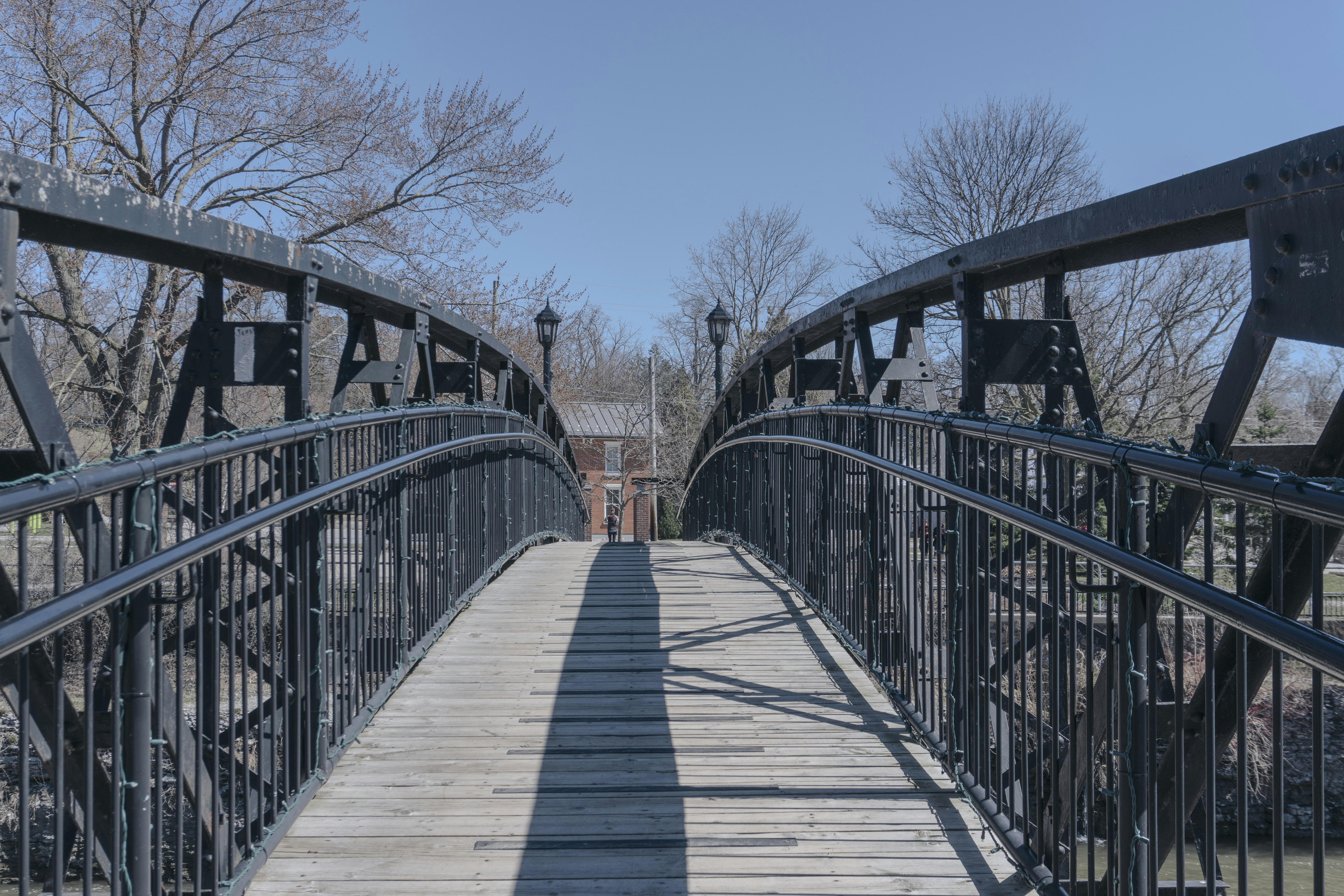 A bridge that has a metal railing on it photo – Free Port hope Image on ...
