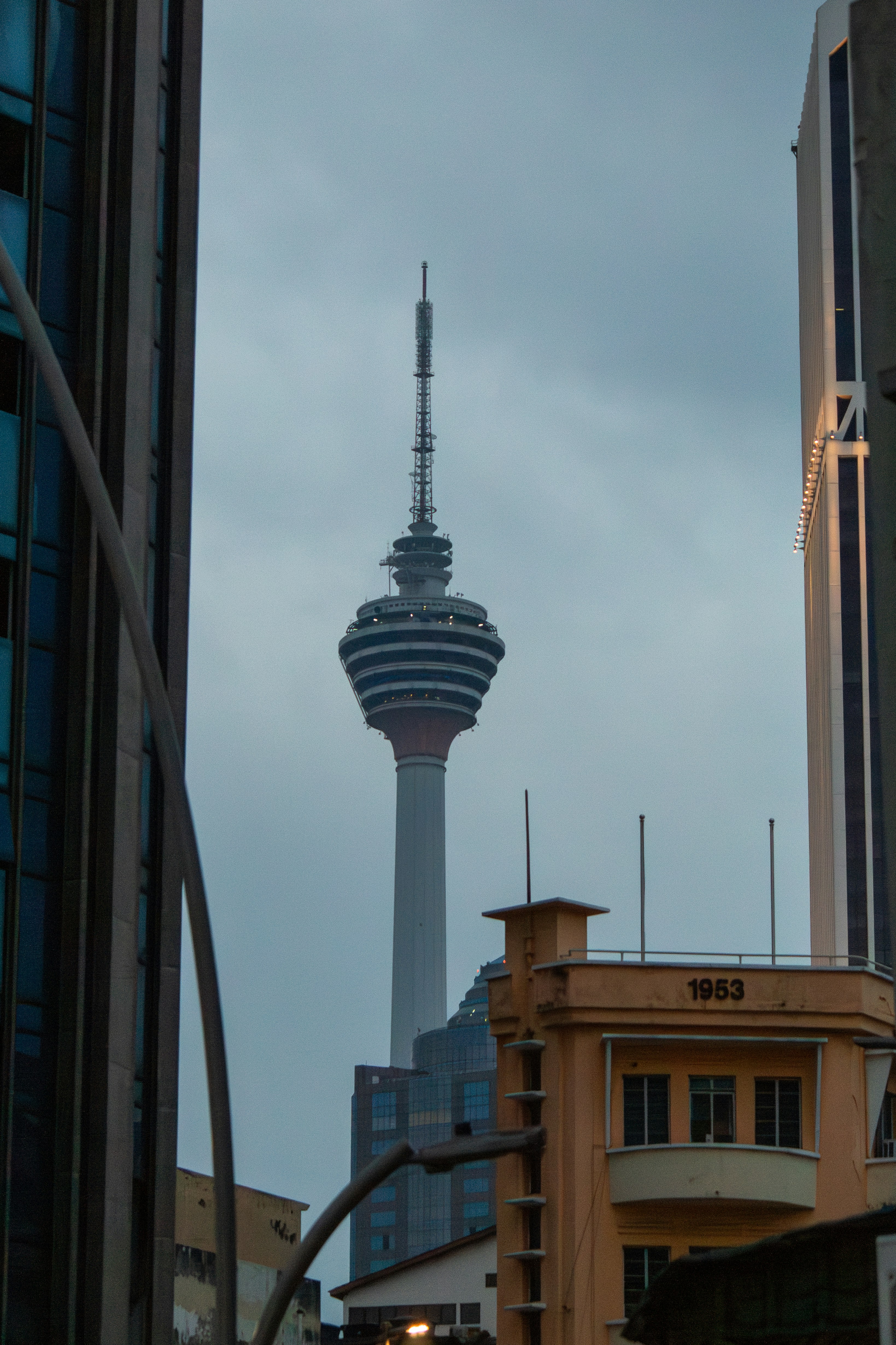 A very tall tower towering over a city photo – Free Grey Image on Unsplash