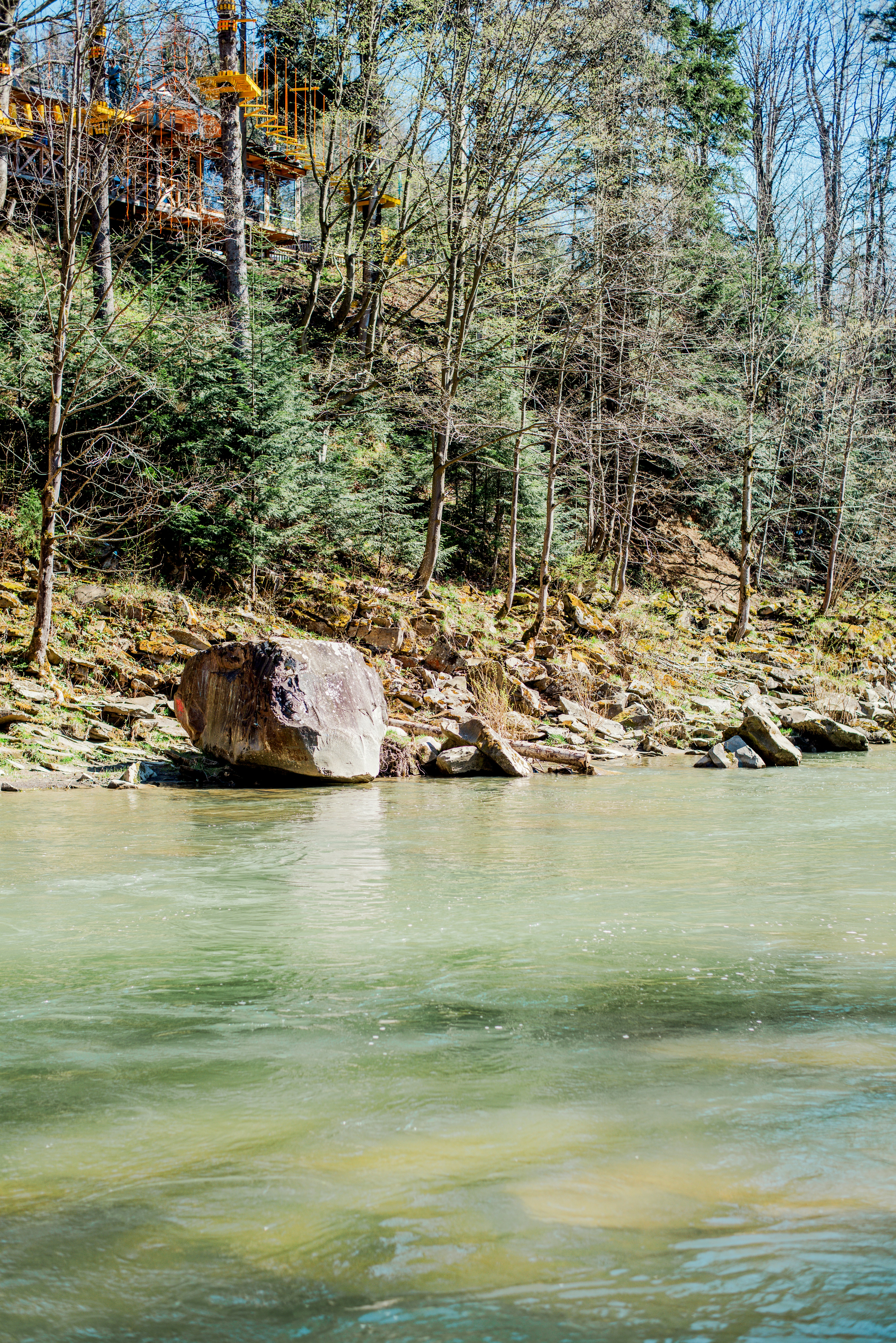 Timber-Deck Overlook by a Turquoise River