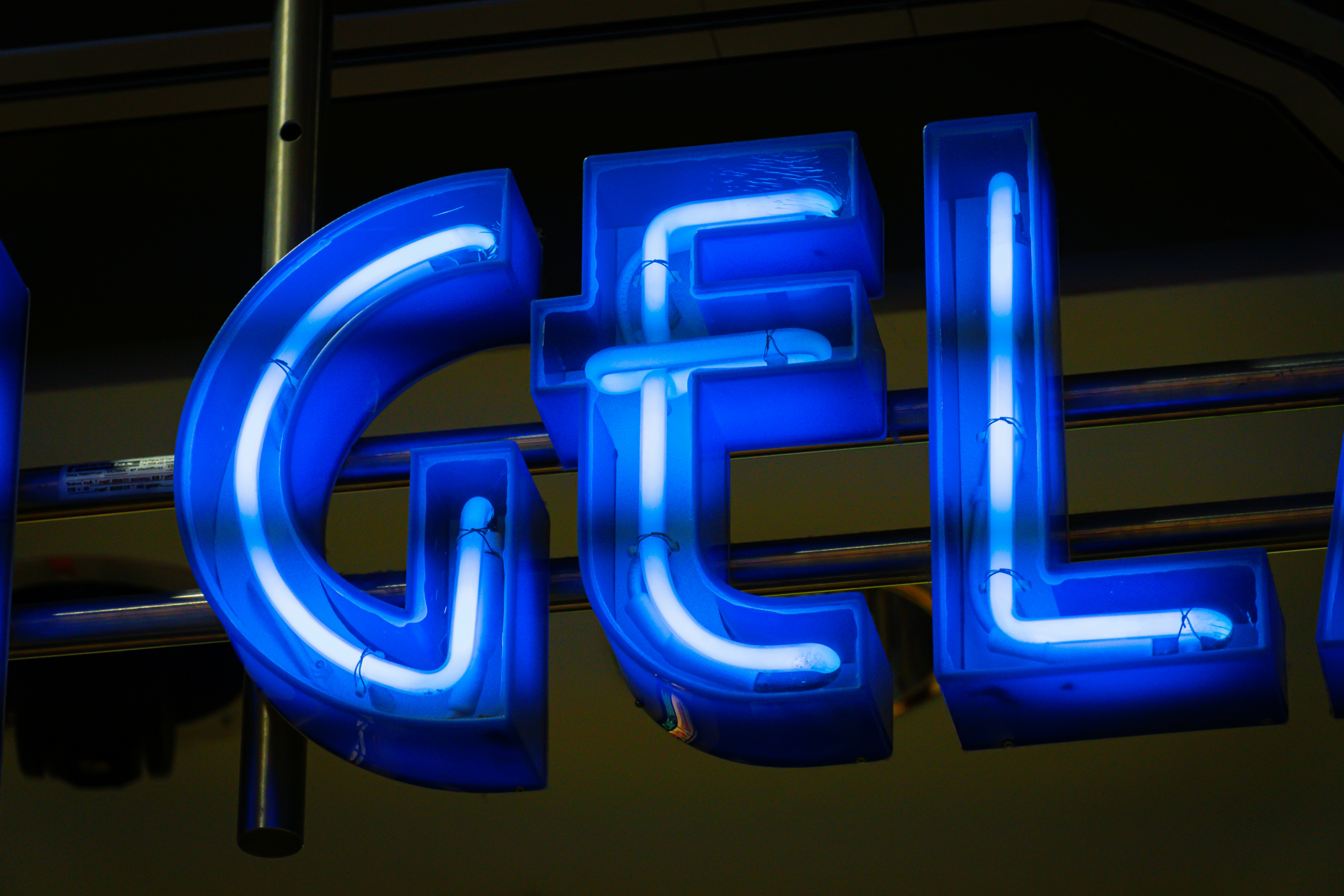 A blue neon sign that reads intel on it photo – Free Berlin Image on ...