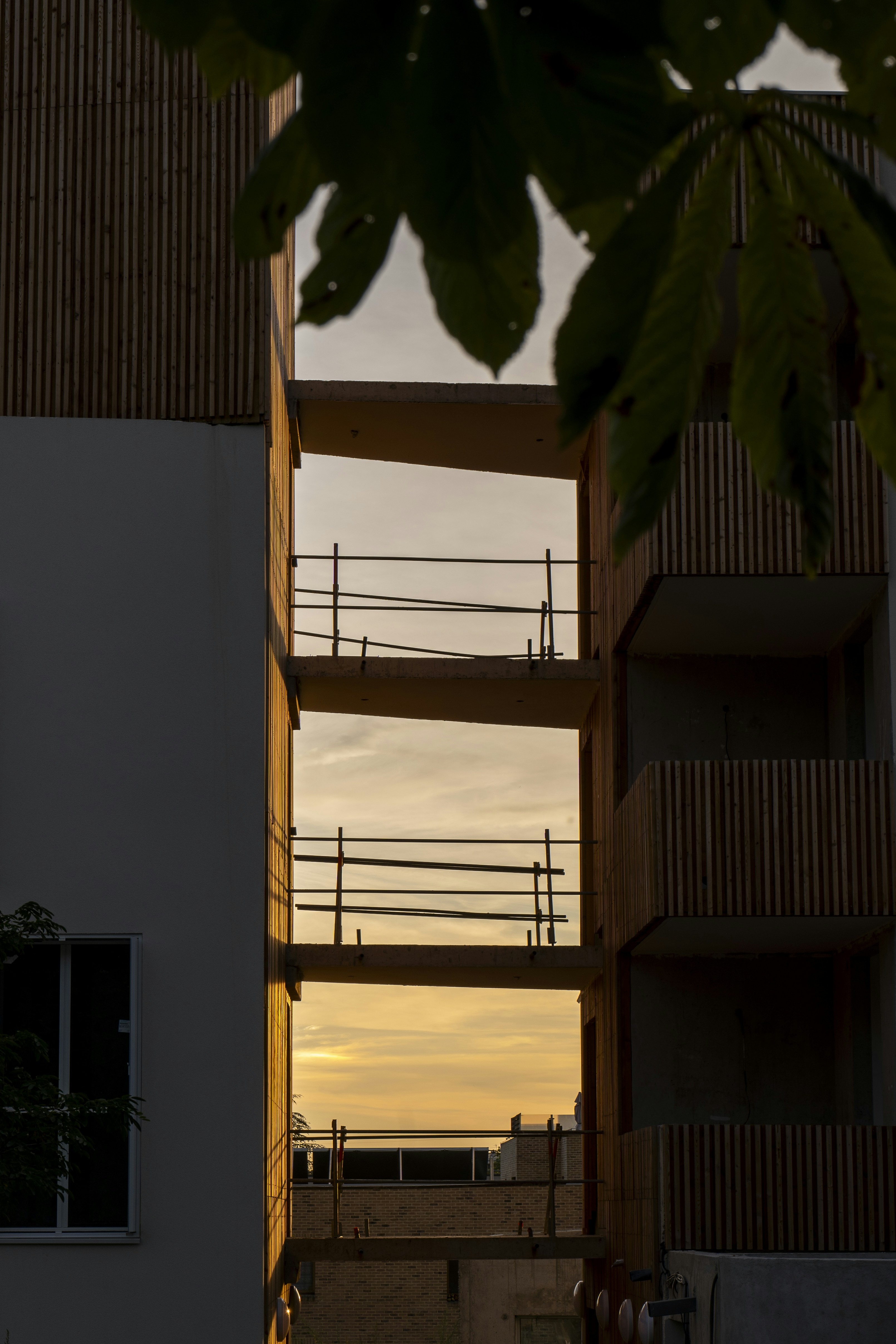 Sunset Between-Towers: Framed Balcony Gaps