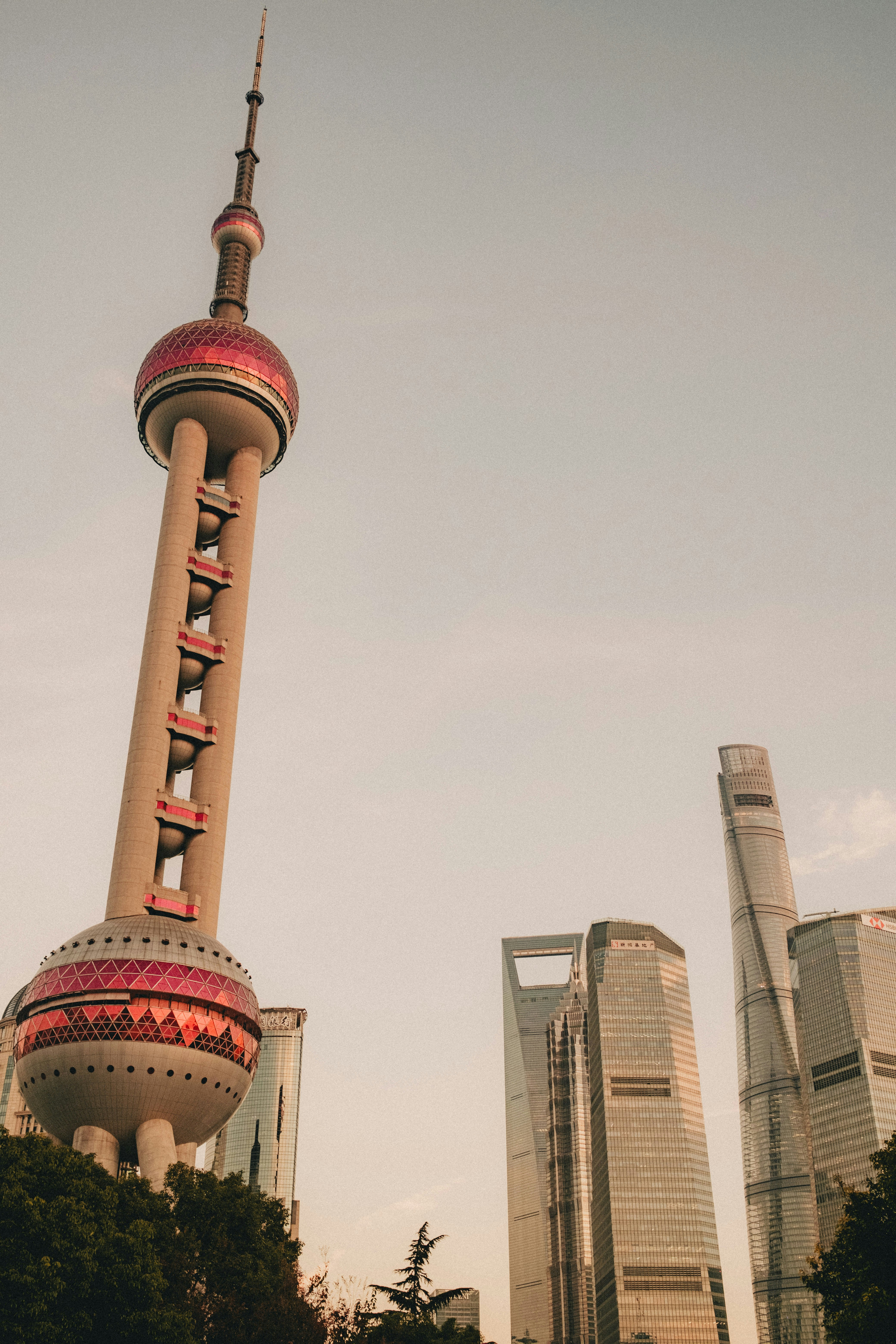 Crimson Spheres and Steel Giants: Oriental Pearl Tower Anchors Shanghai's Glass Skyline