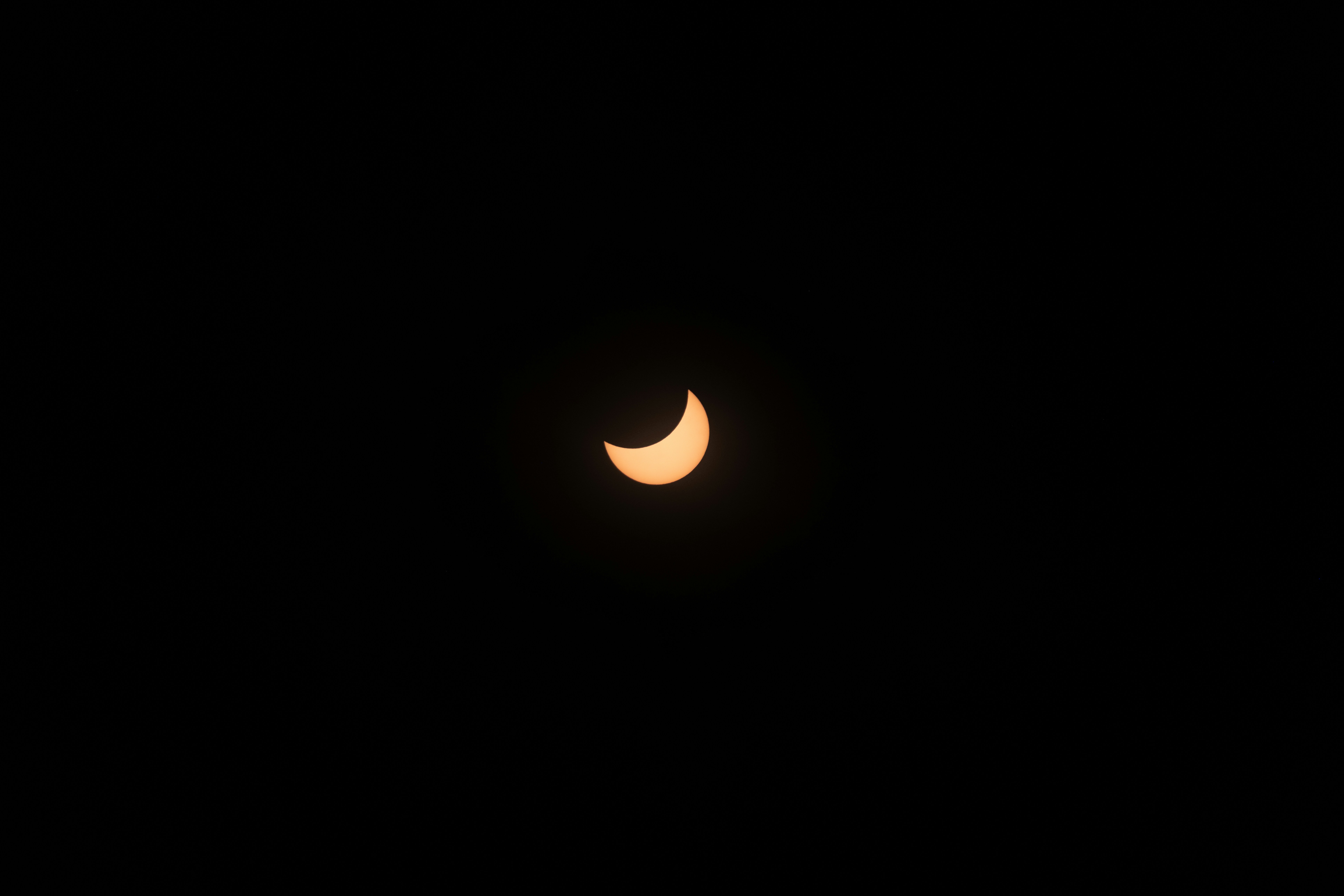 A partial solar eclipse seen through a telescope lens photo – Free Moon ...