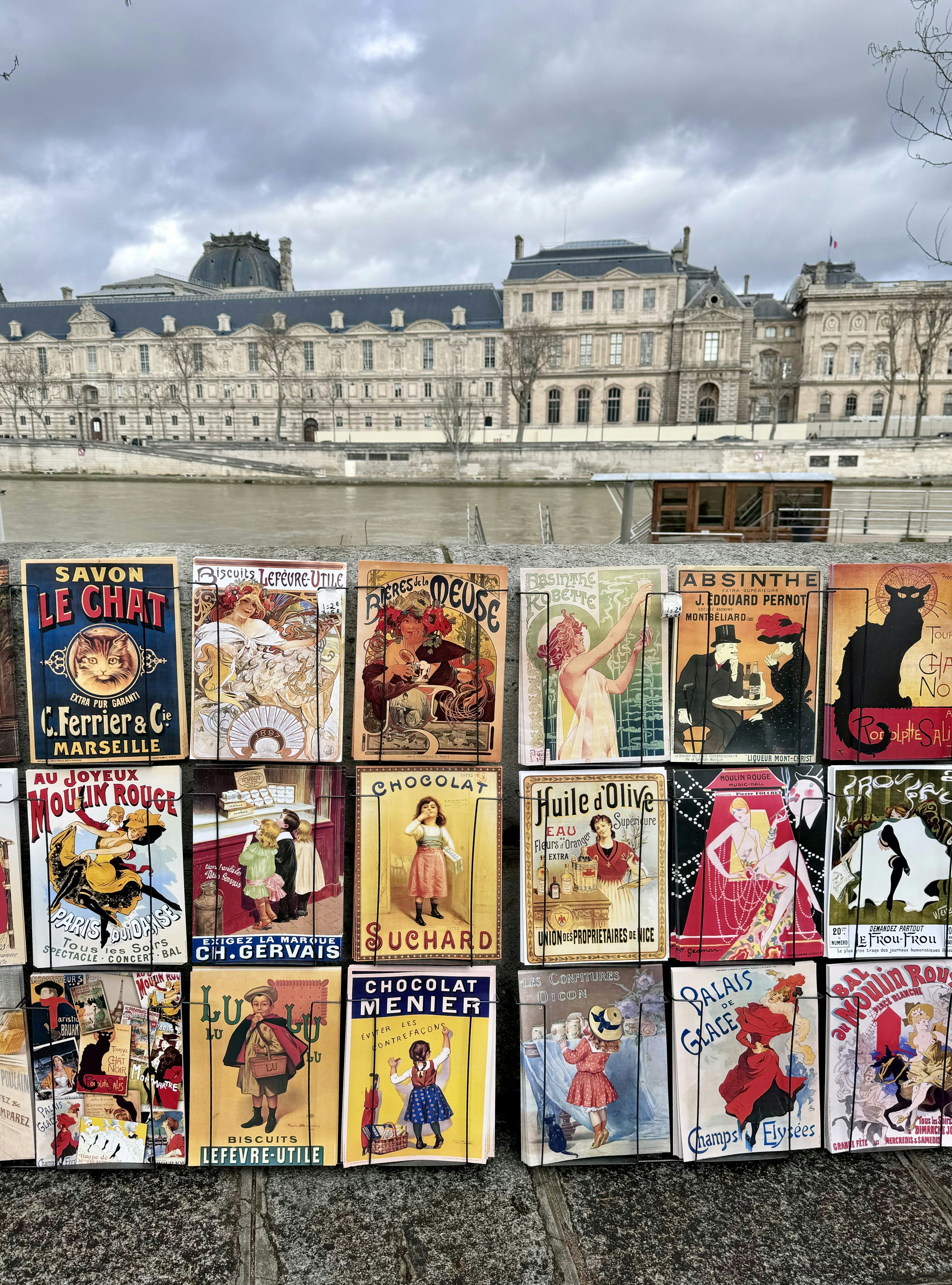 A bunch of posters are hanging on a wall photo – Free Building Image on ...