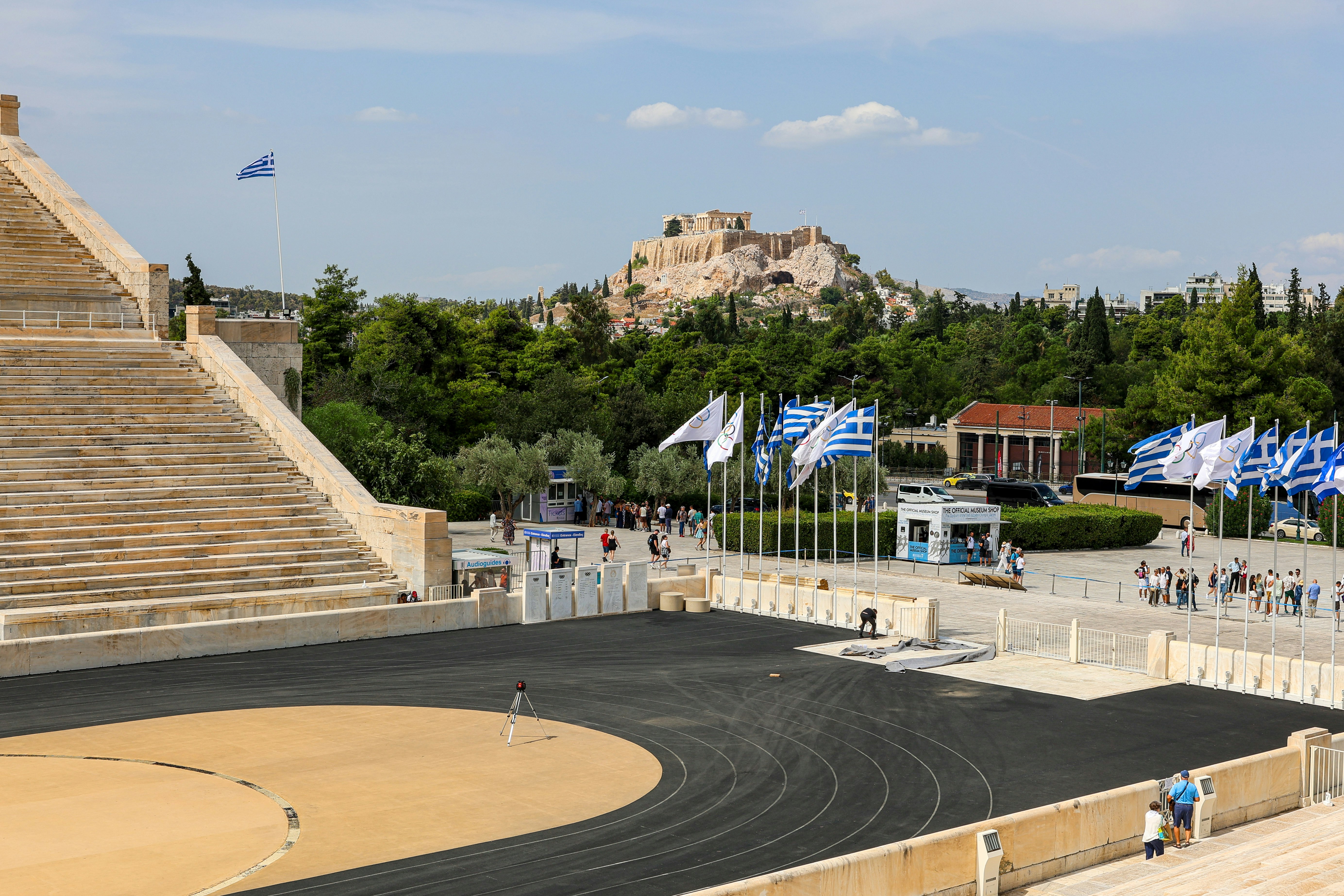 Flag-Fest Beyond the Track: A Citadel Watches Over the Arena