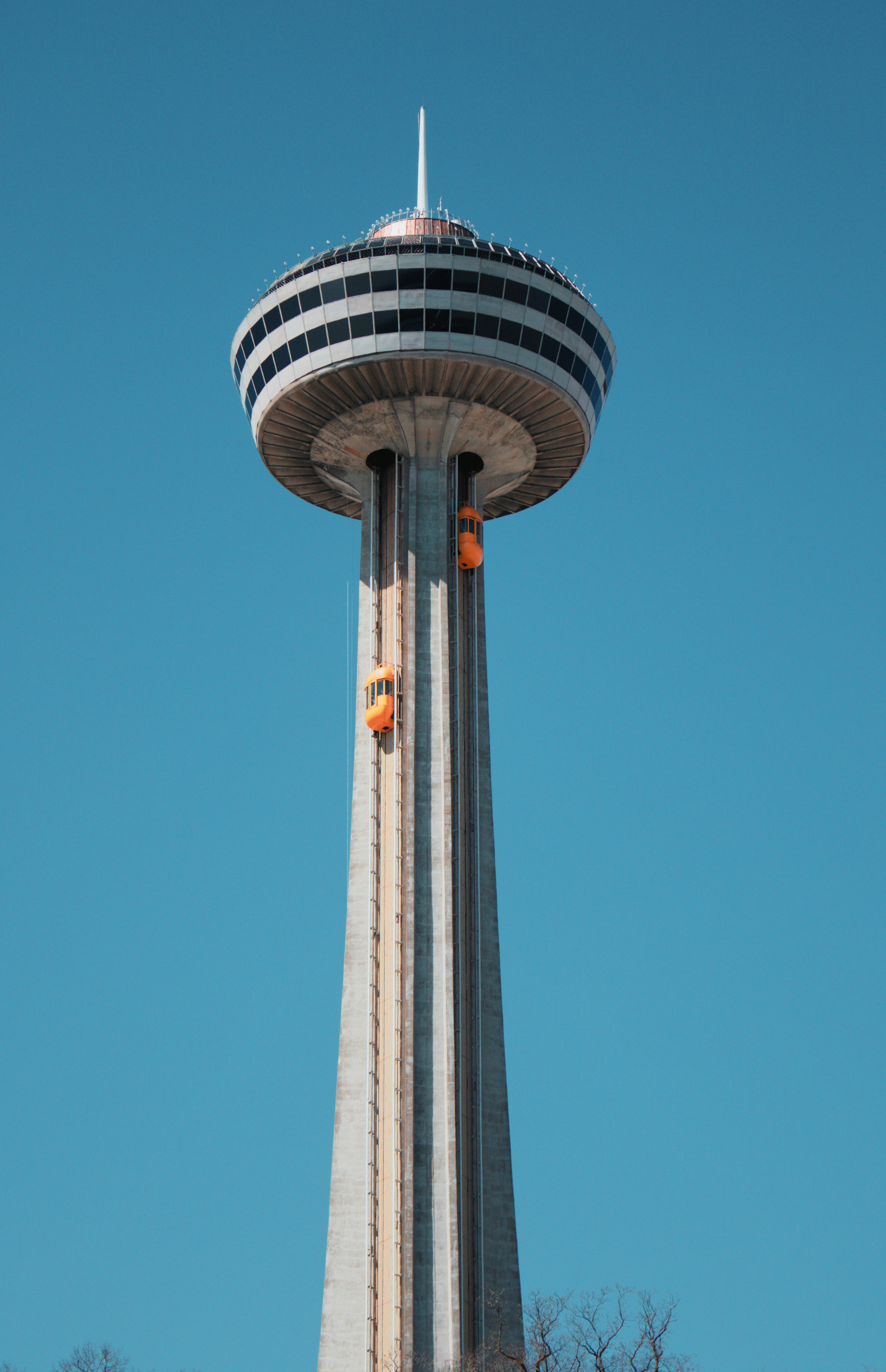 A very tall tower with a clock on it's side photo – Free Niagara falls ...