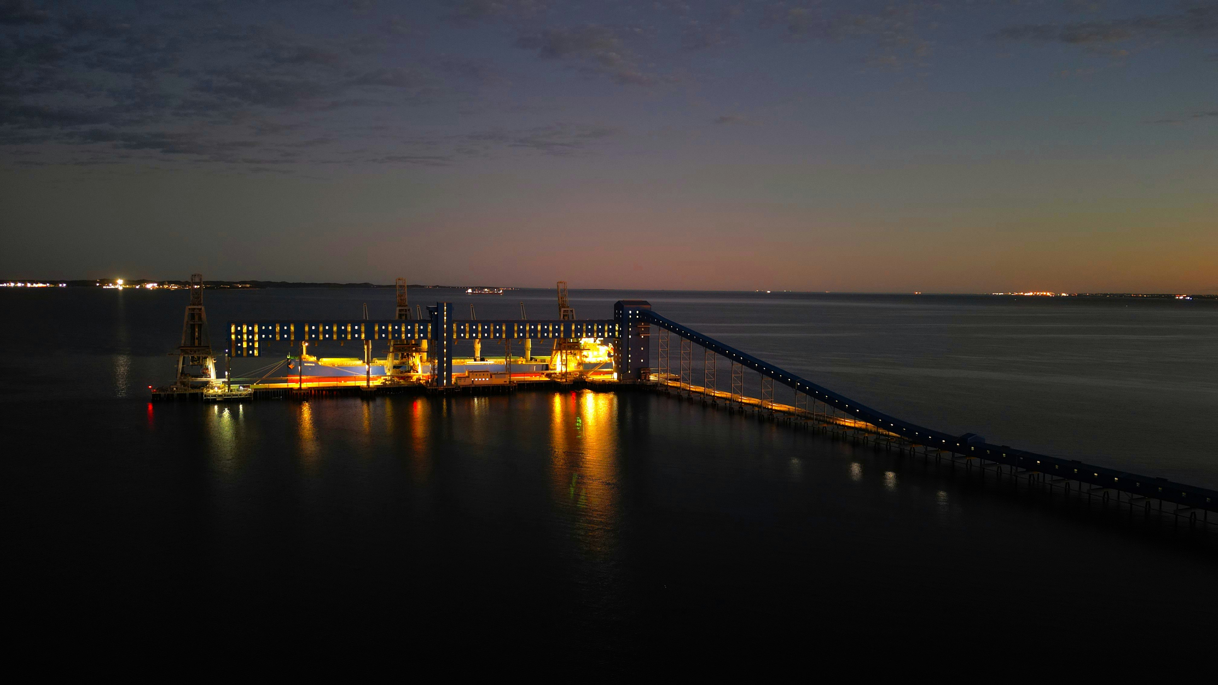 Glowing Pier at Dusk: A Quiet Harbor
