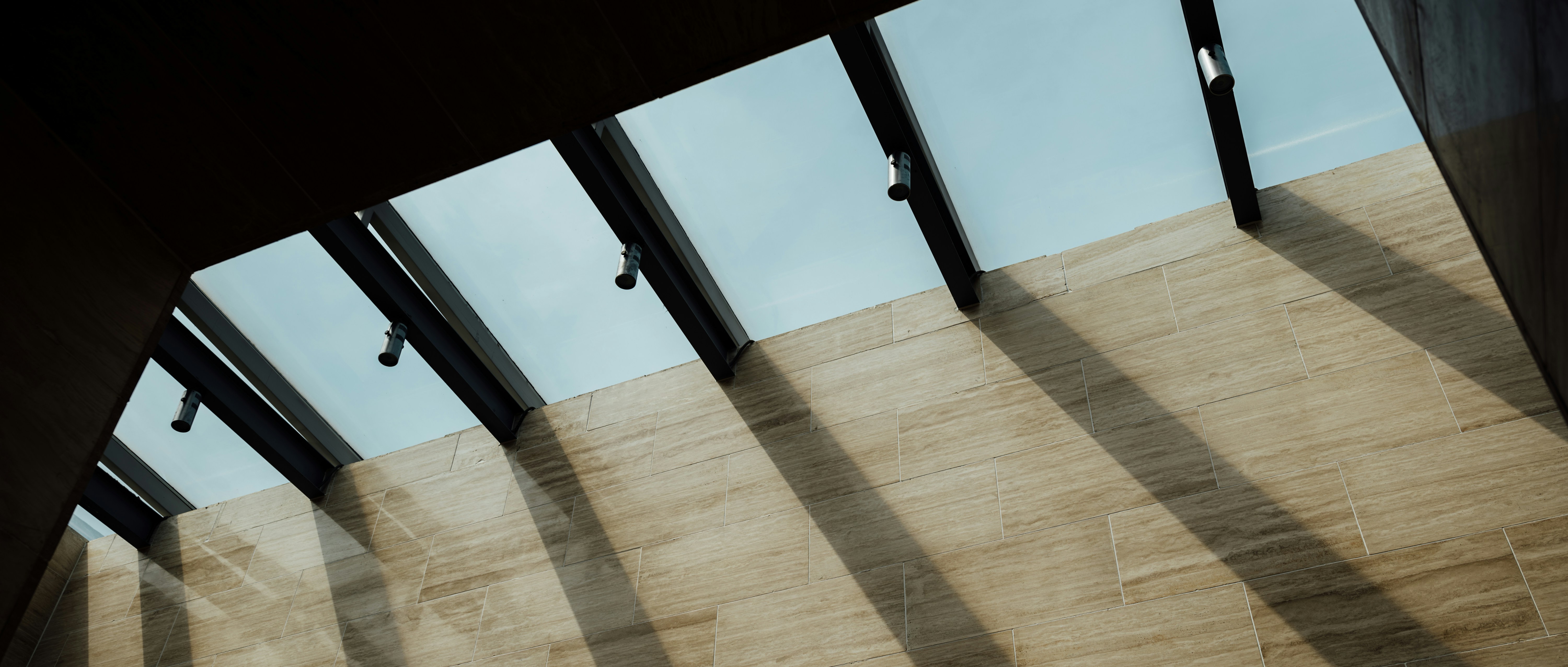 A view of the outside of a building through a window photo – Free Floor ...