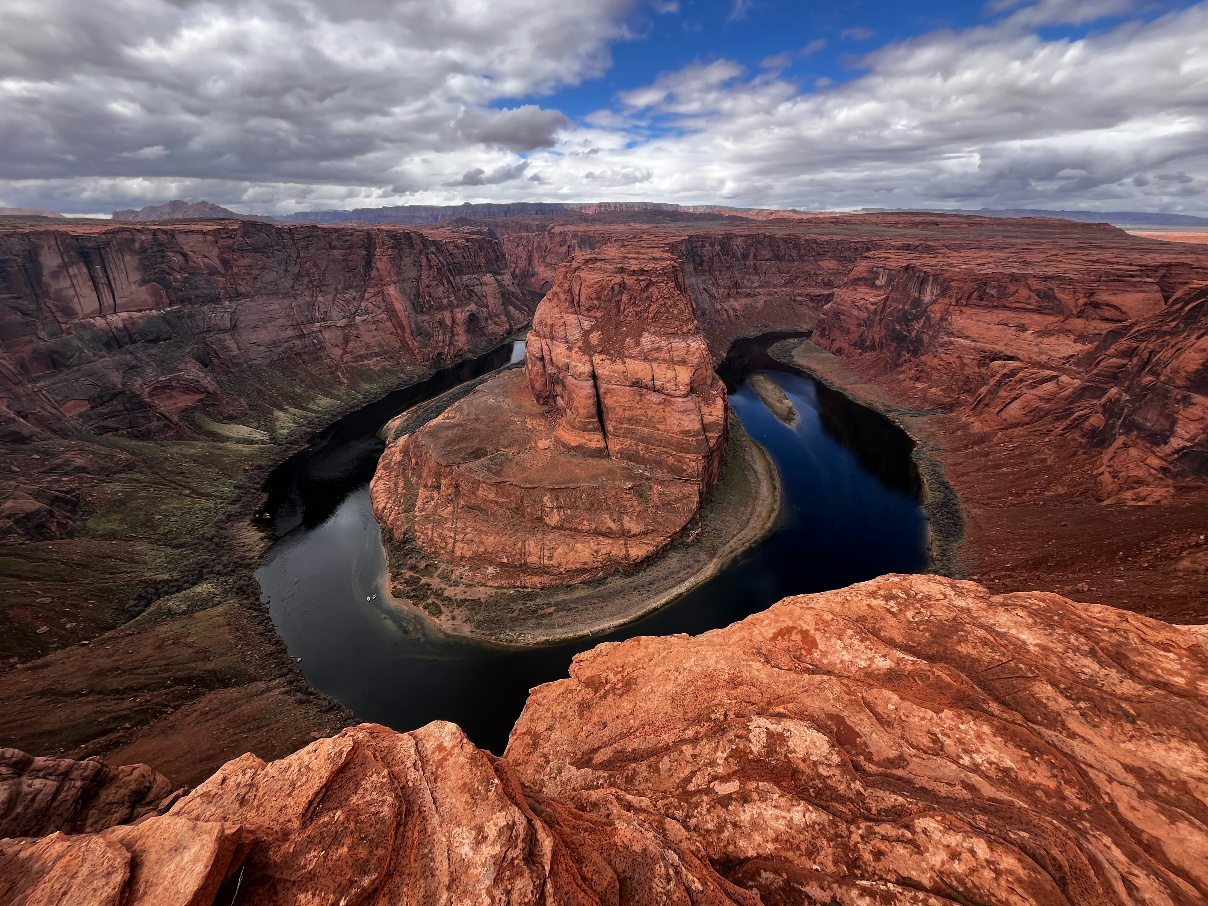 Canyon Whirlpool: A Meandering Red Rock Vista Framed by a Serpentine River
