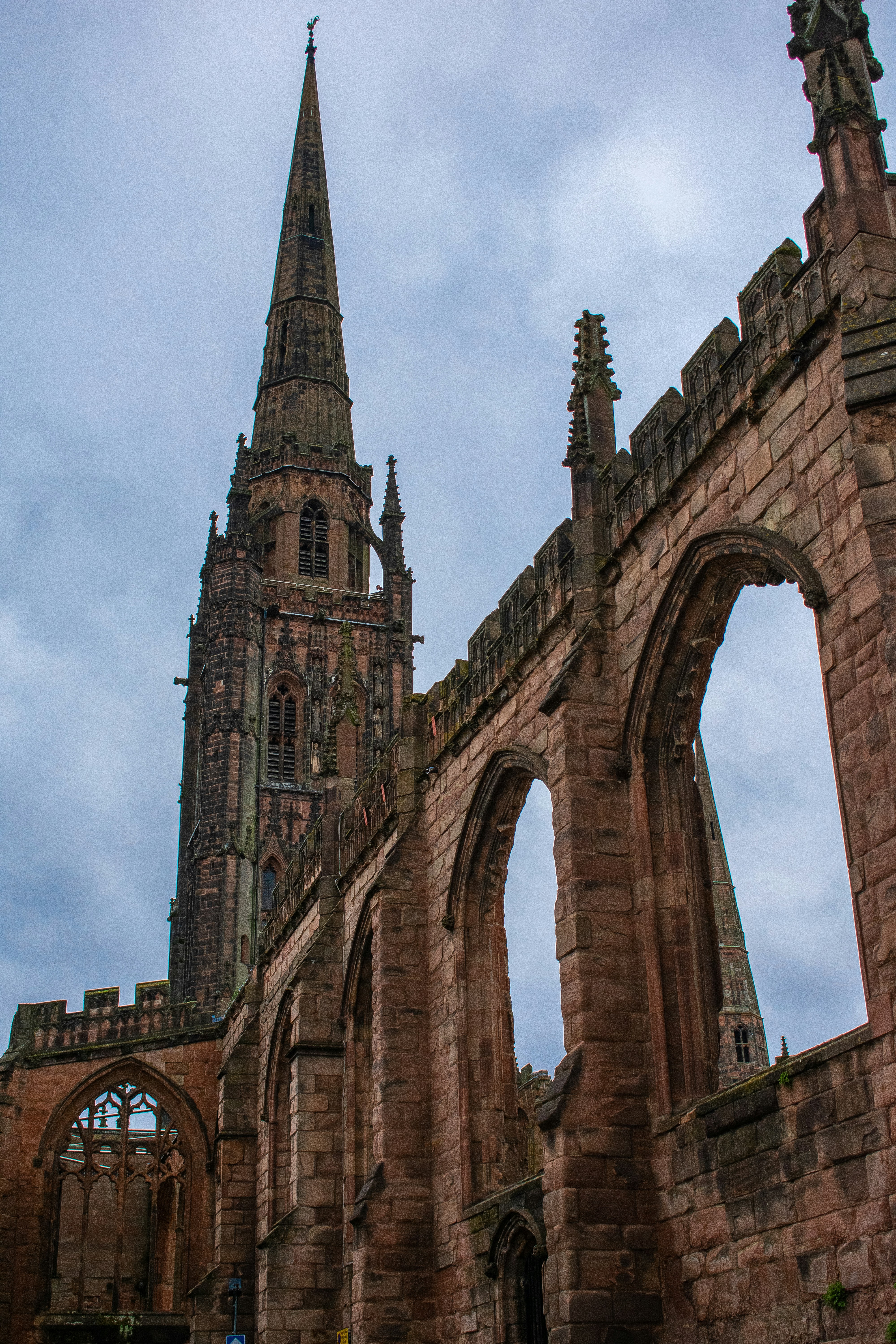 A very tall building with a clock on it's side photo – Free Coventry ...