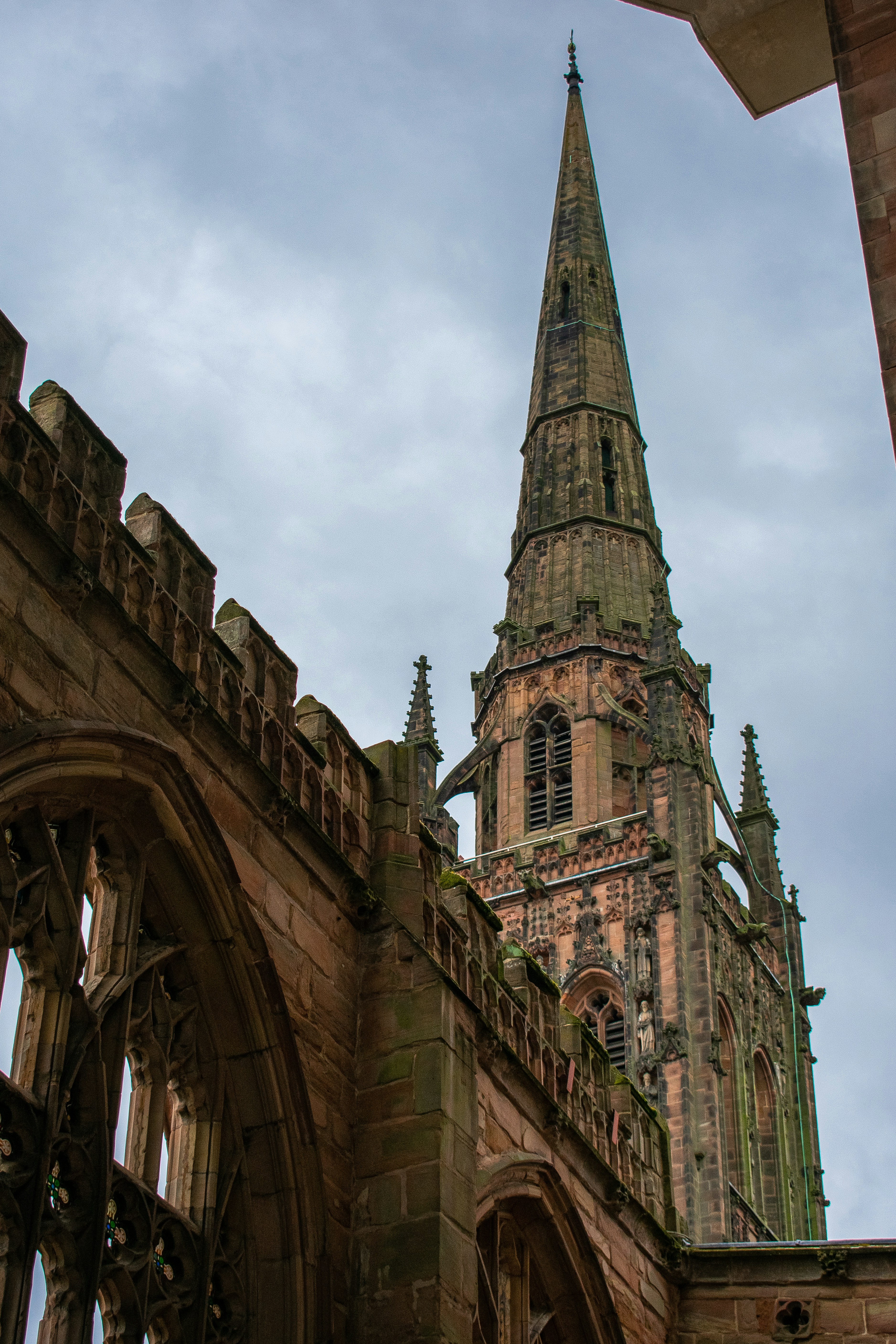A tall tower with a clock on it's side photo – Free Coventry Image on ...