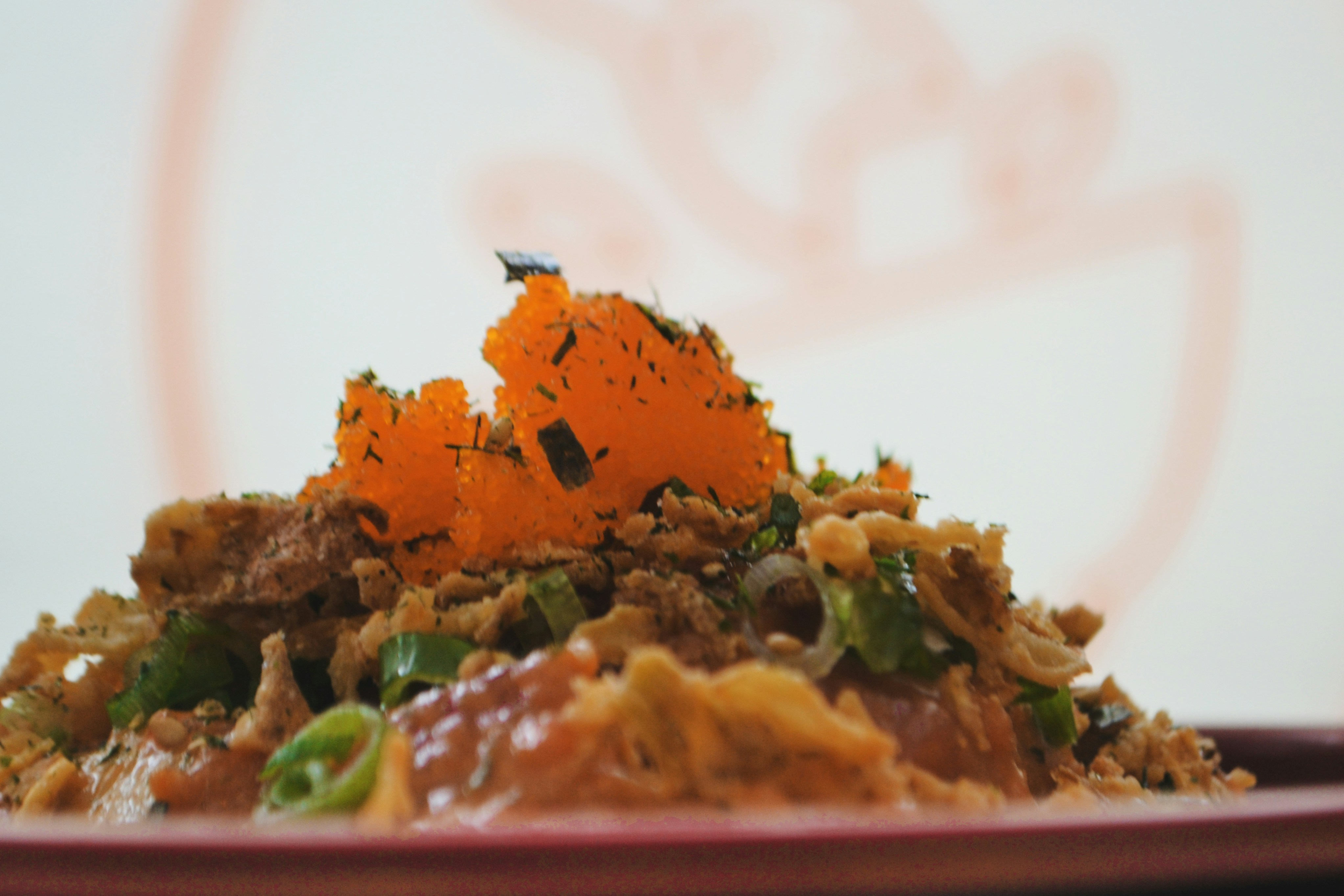 Orange Crisp Crown Over a Savory, Saucy Platter