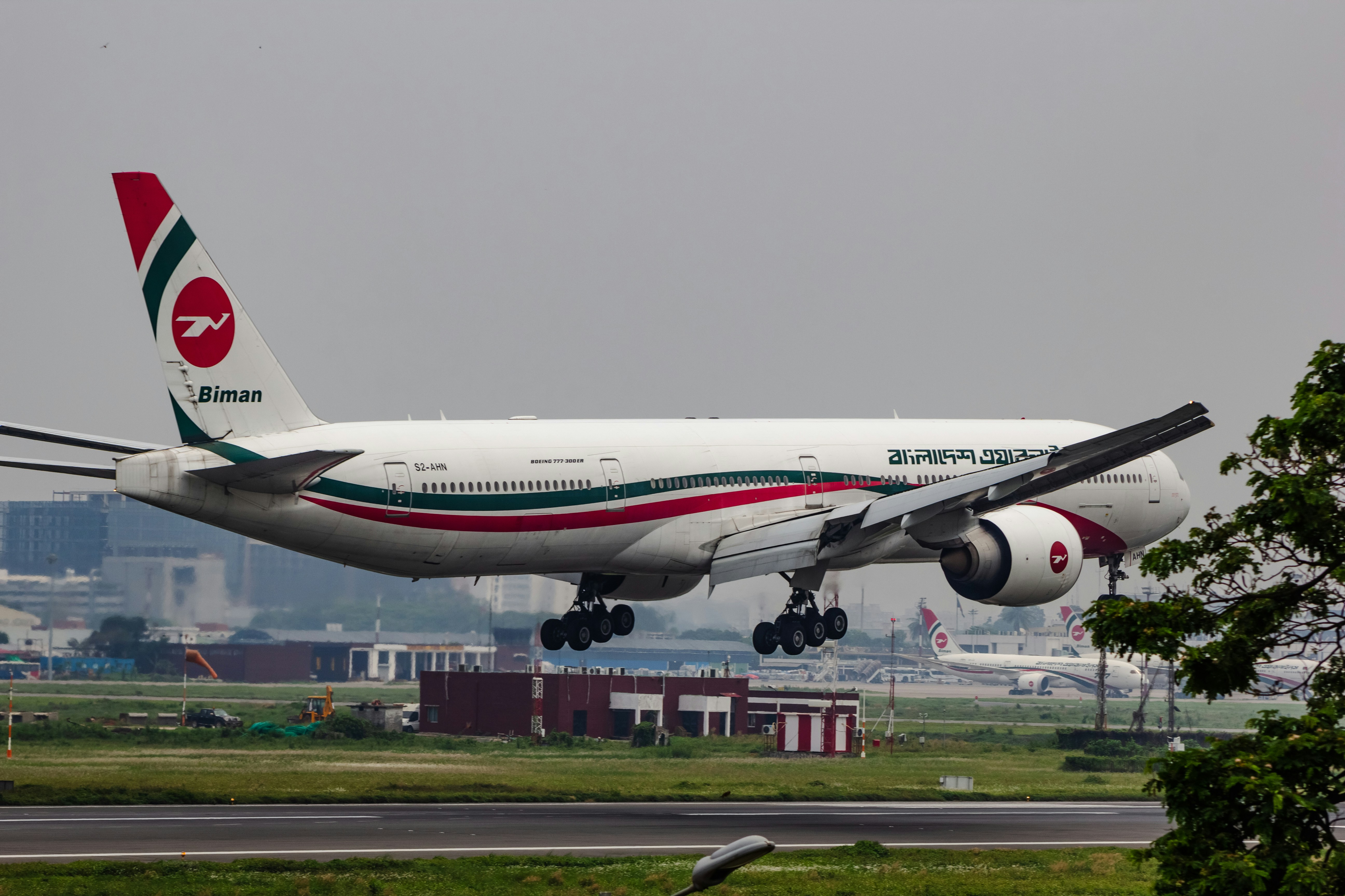 A large jetliner taking off from an airport runway photo – Free ...