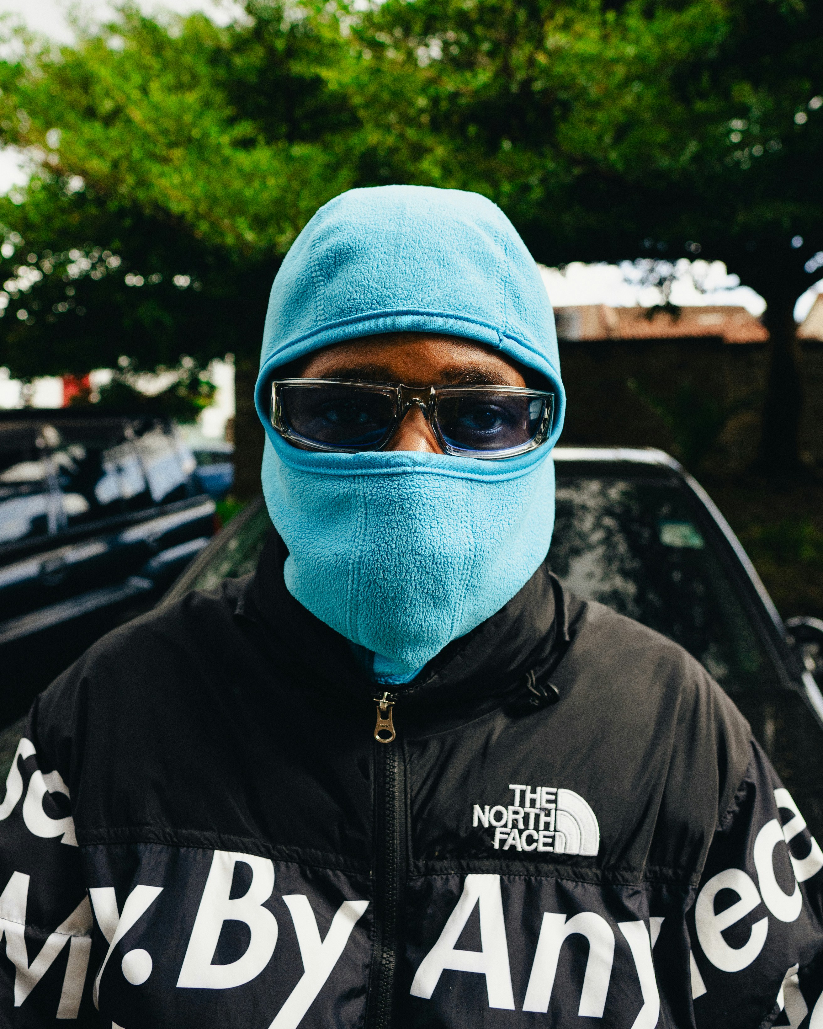 A man wearing a blue mask and a black jacket photo – Free Ybw smith ...