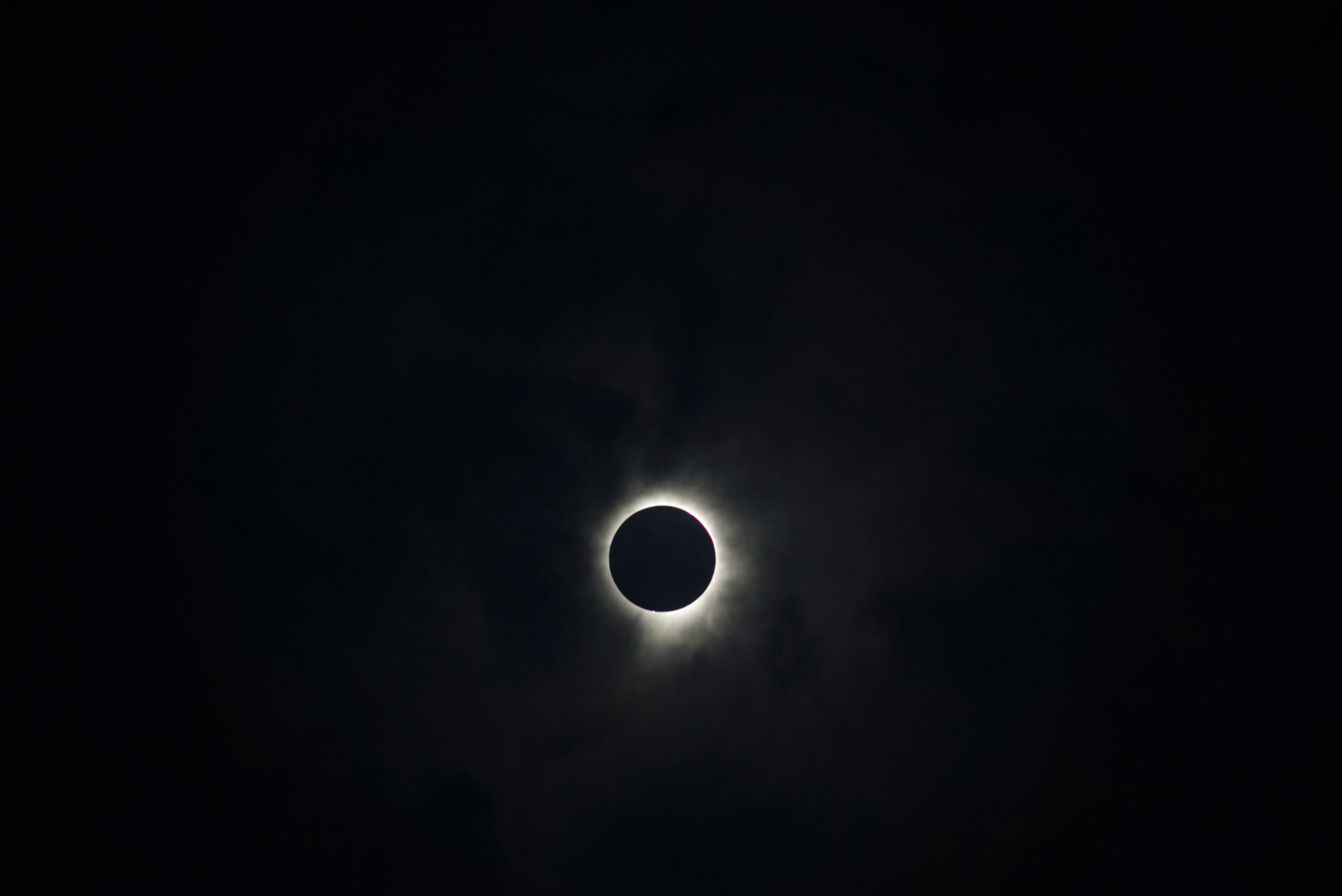 A solar eclipse is seen in the dark sky photo – Free Canada Image on ...